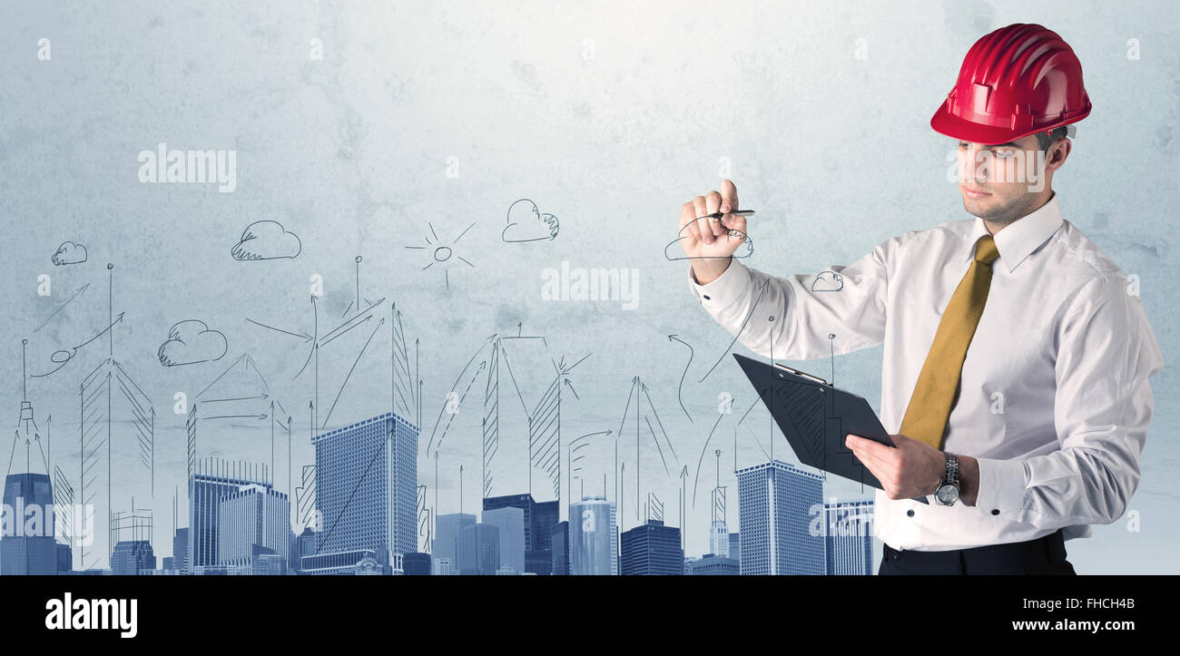 Young worker drawing a city sight Stock Photo - Alamy