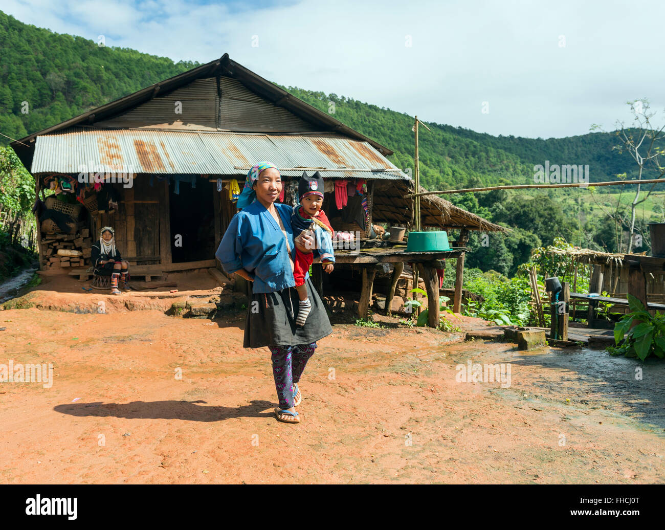 Mother and child in an Akha village, Burma Stock Photo - Alamy