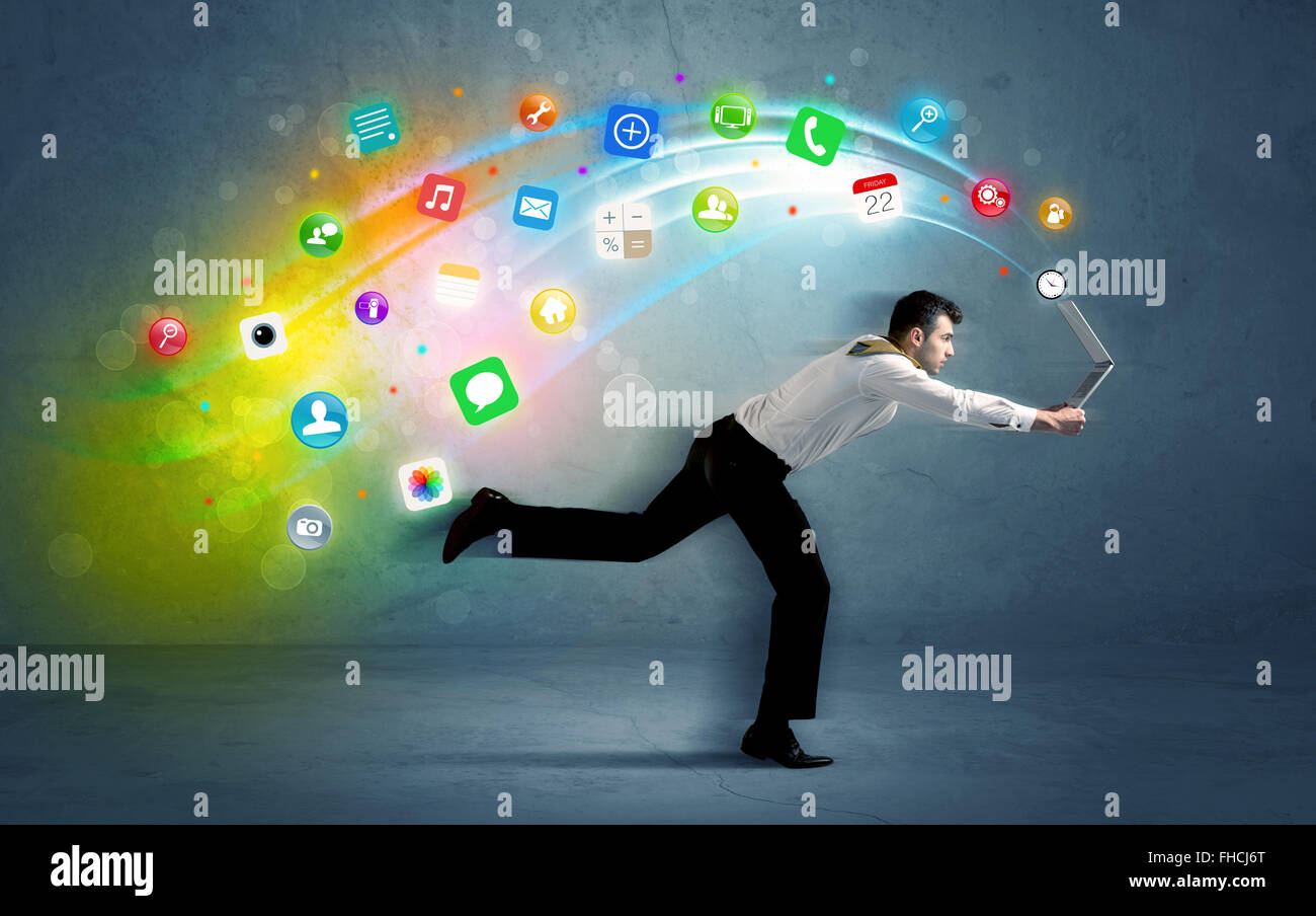 Running businessman with application icons from device Stock Photo - Alamy