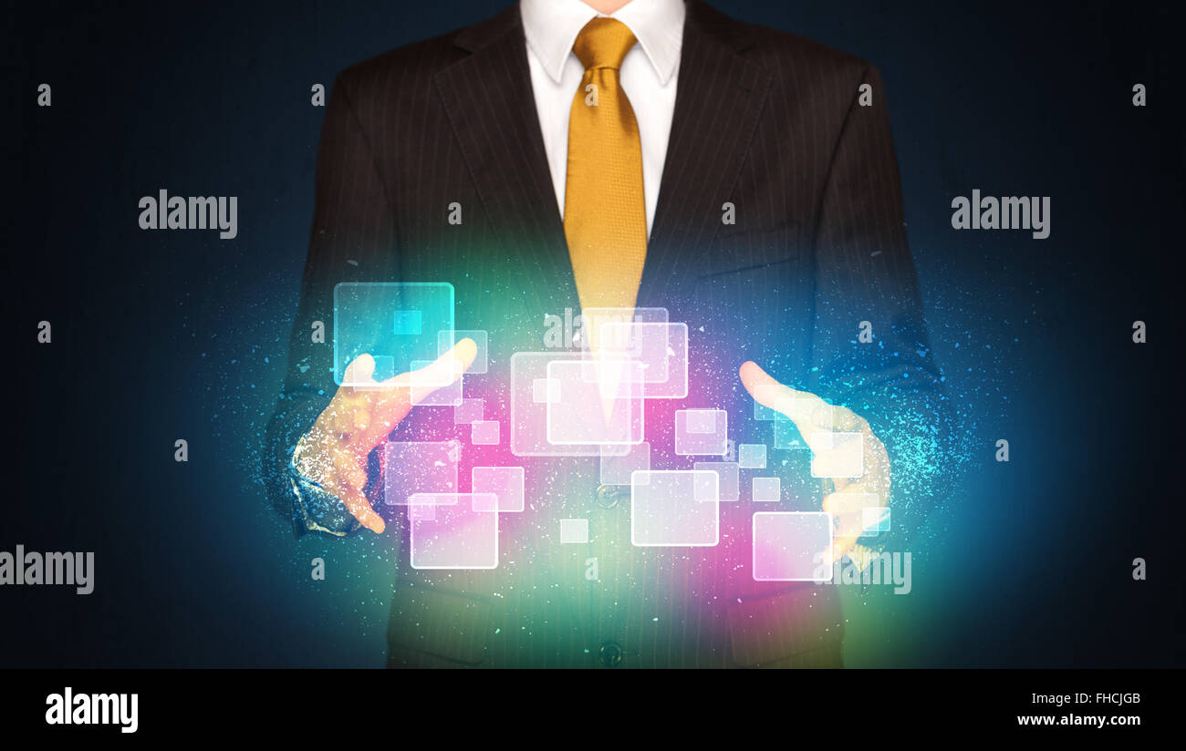 man holding abstract icons Stock Photo - Alamy