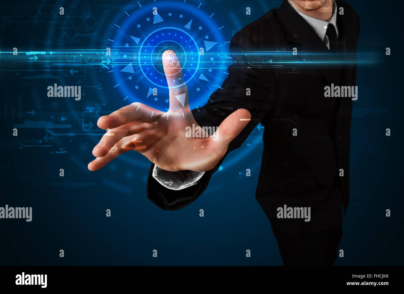 Handsome tech guy pressing high technology control panel screen concept ...