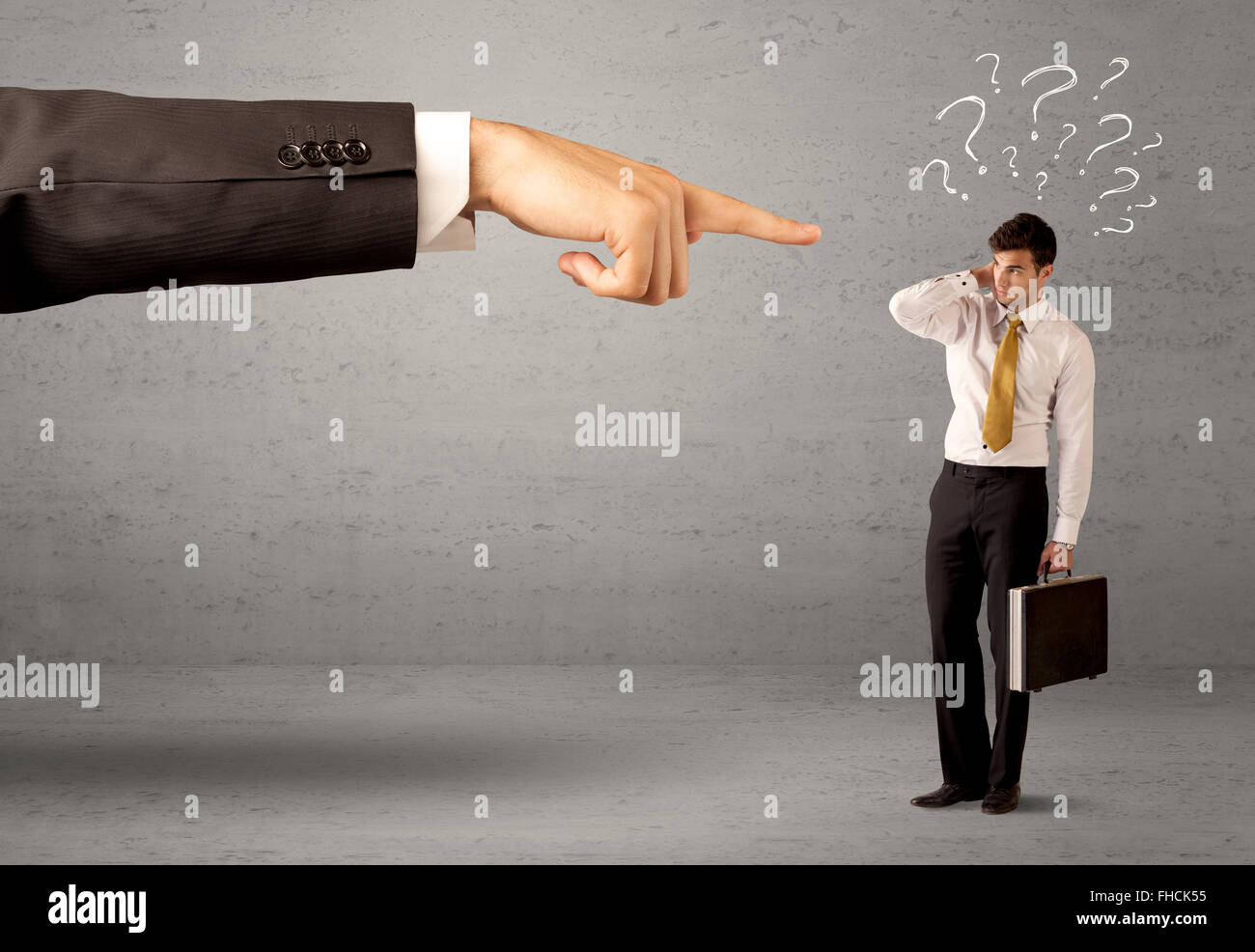 Confused employee getting order from boss Stock Photo - Alamy