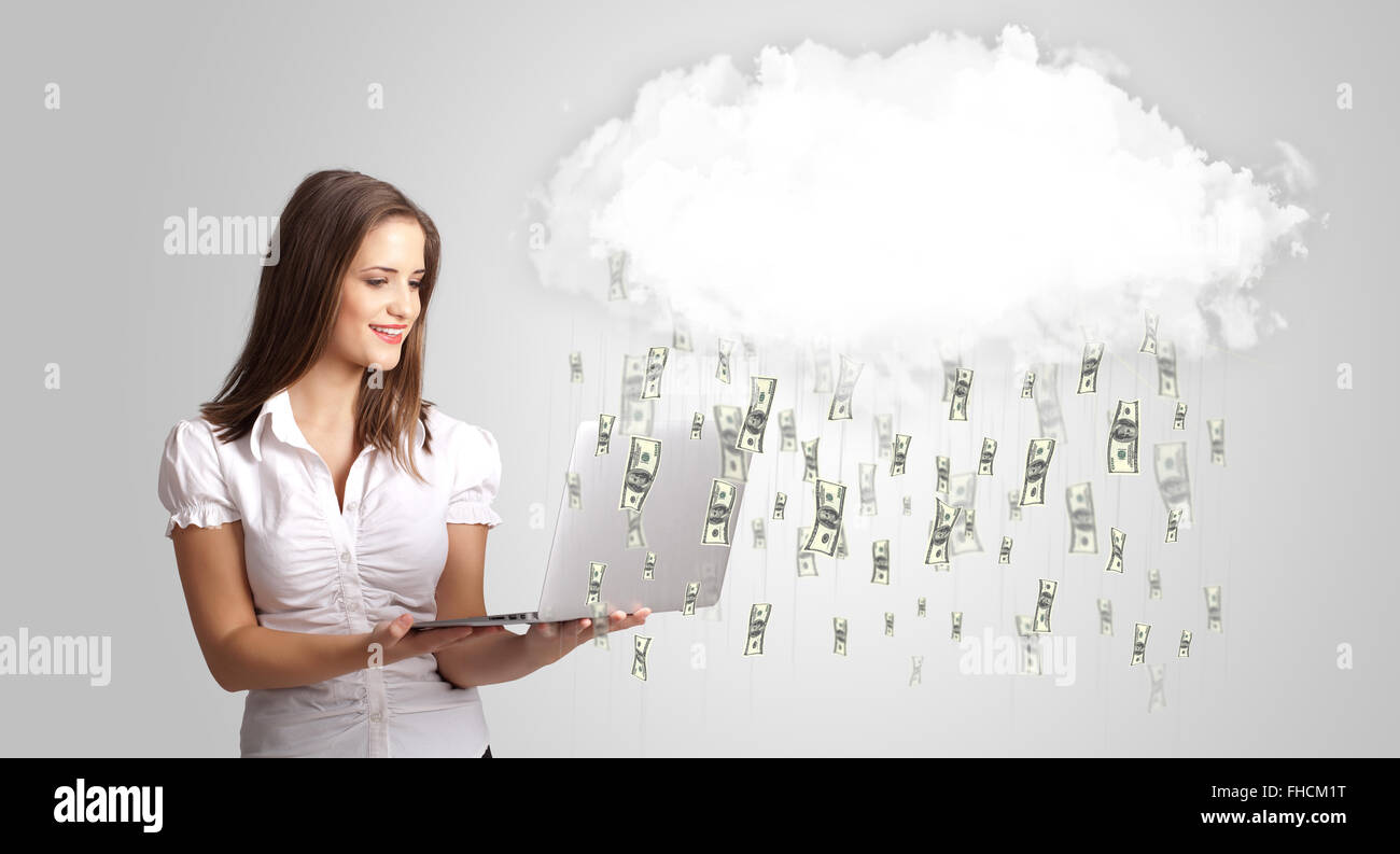 Woman with cloud and money rain concept Stock Photo - Alamy