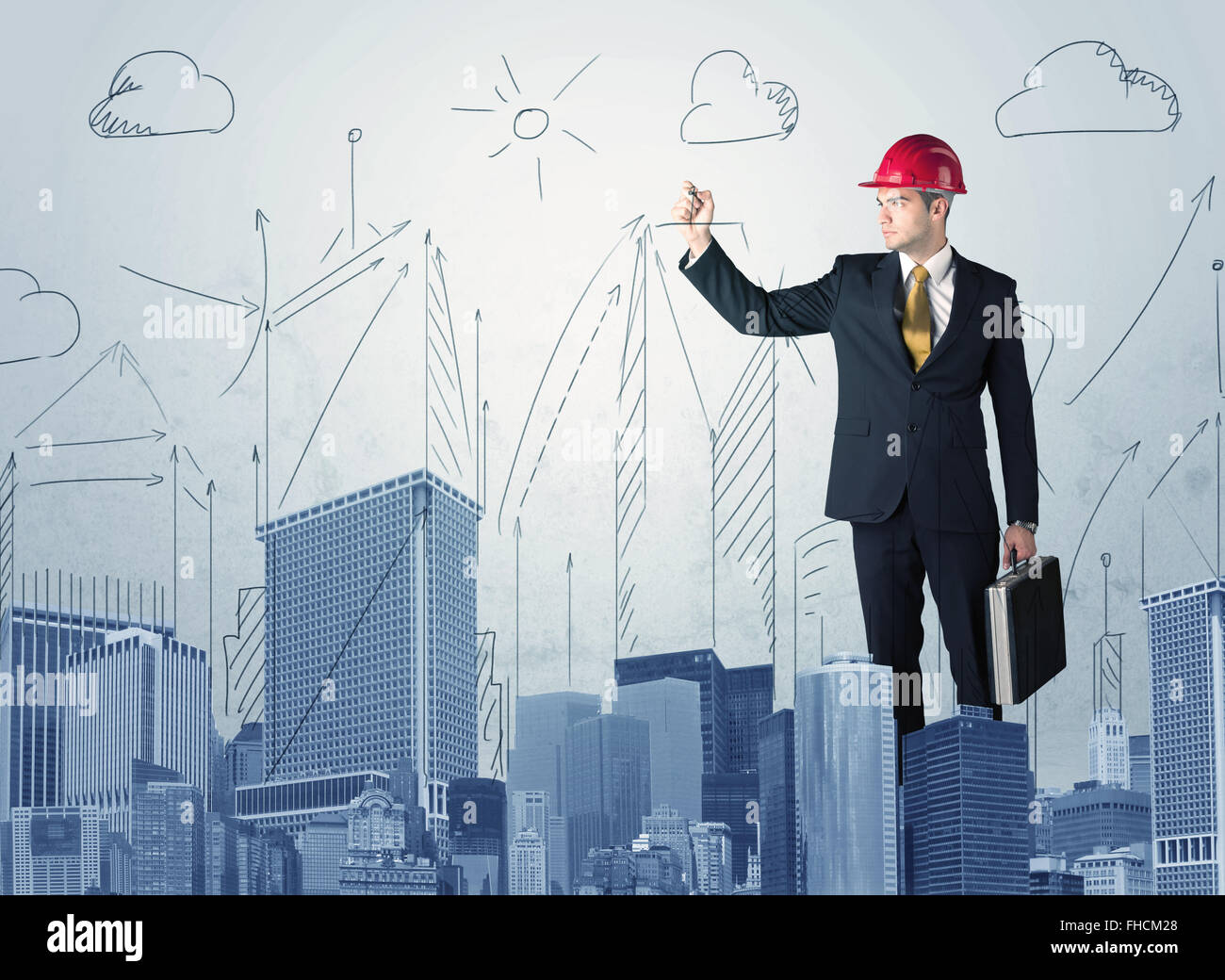 Young worker drawing a city sight Stock Photo - Alamy