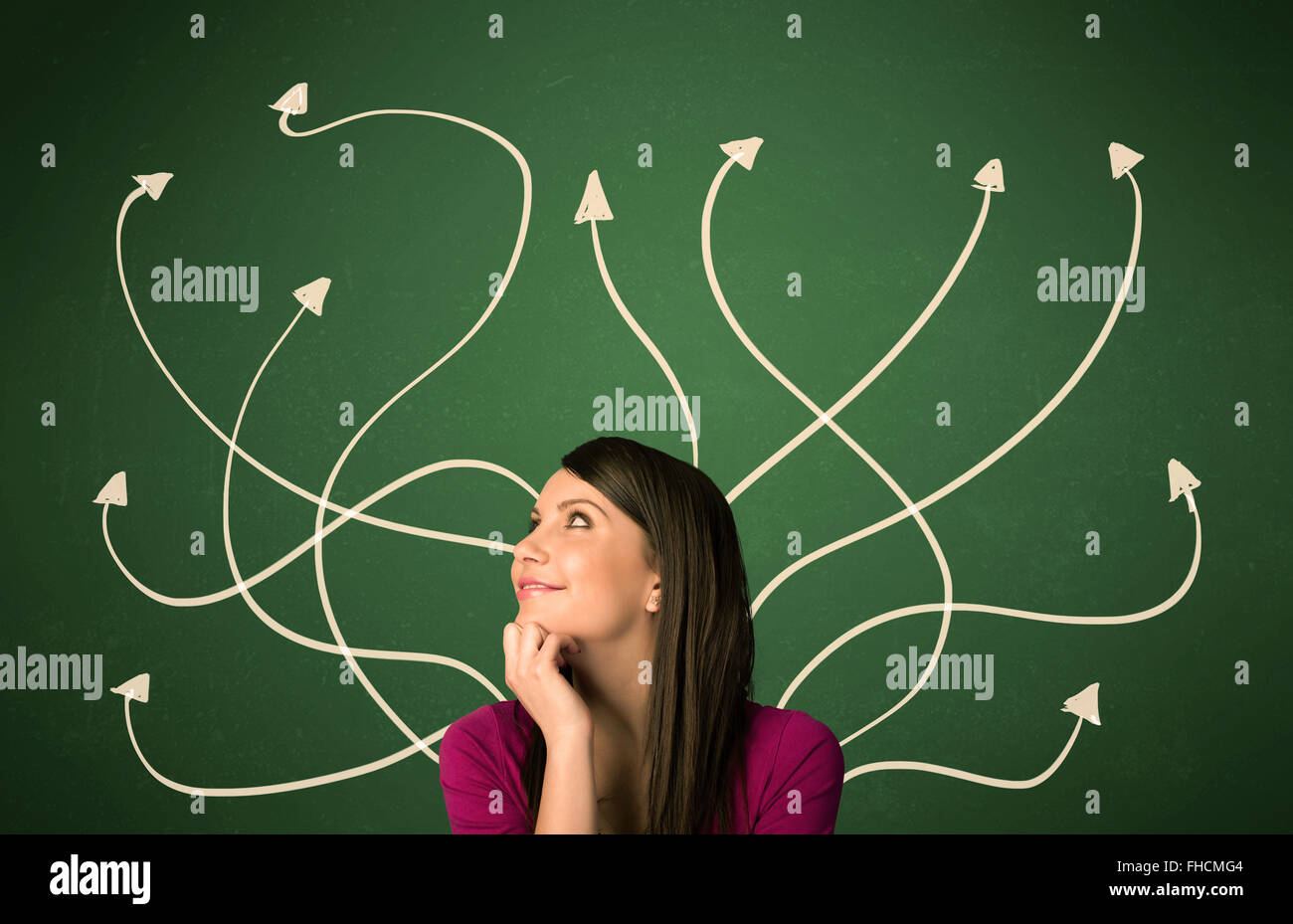 Beautiful girl thinking a solution Stock Photo - Alamy