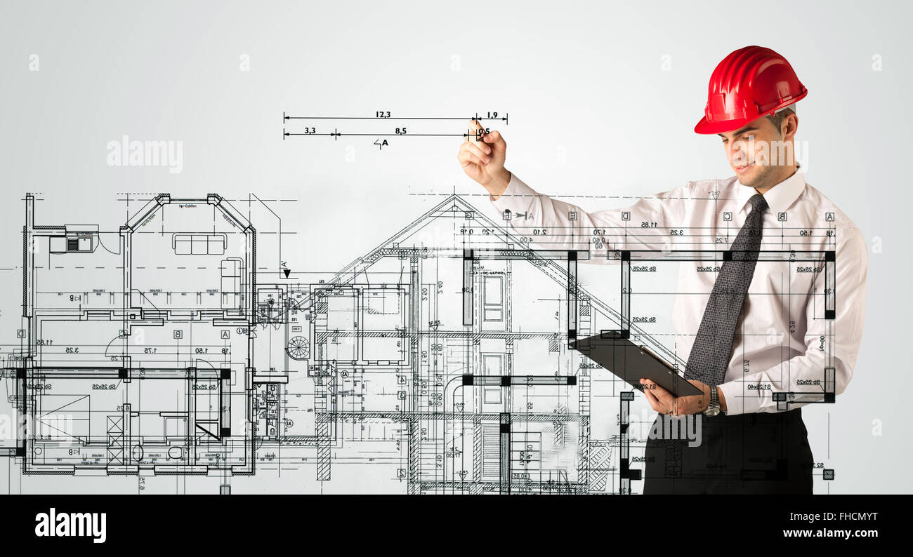 An young architect drawing a house plan Stock Photo - Alamy