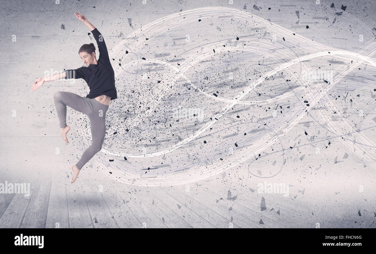 Performance ballet dancer jumping with energy explosion particles Stock ...