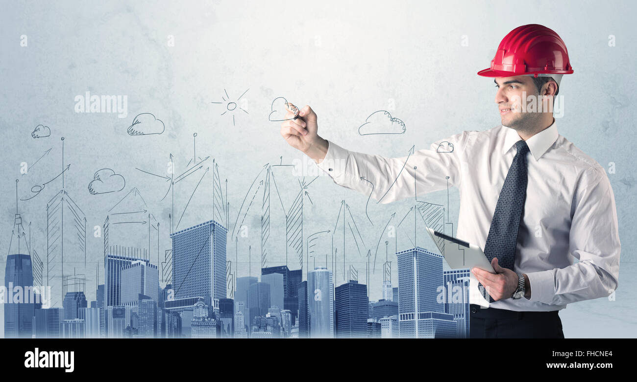 Young worker drawing a city sight Stock Photo - Alamy