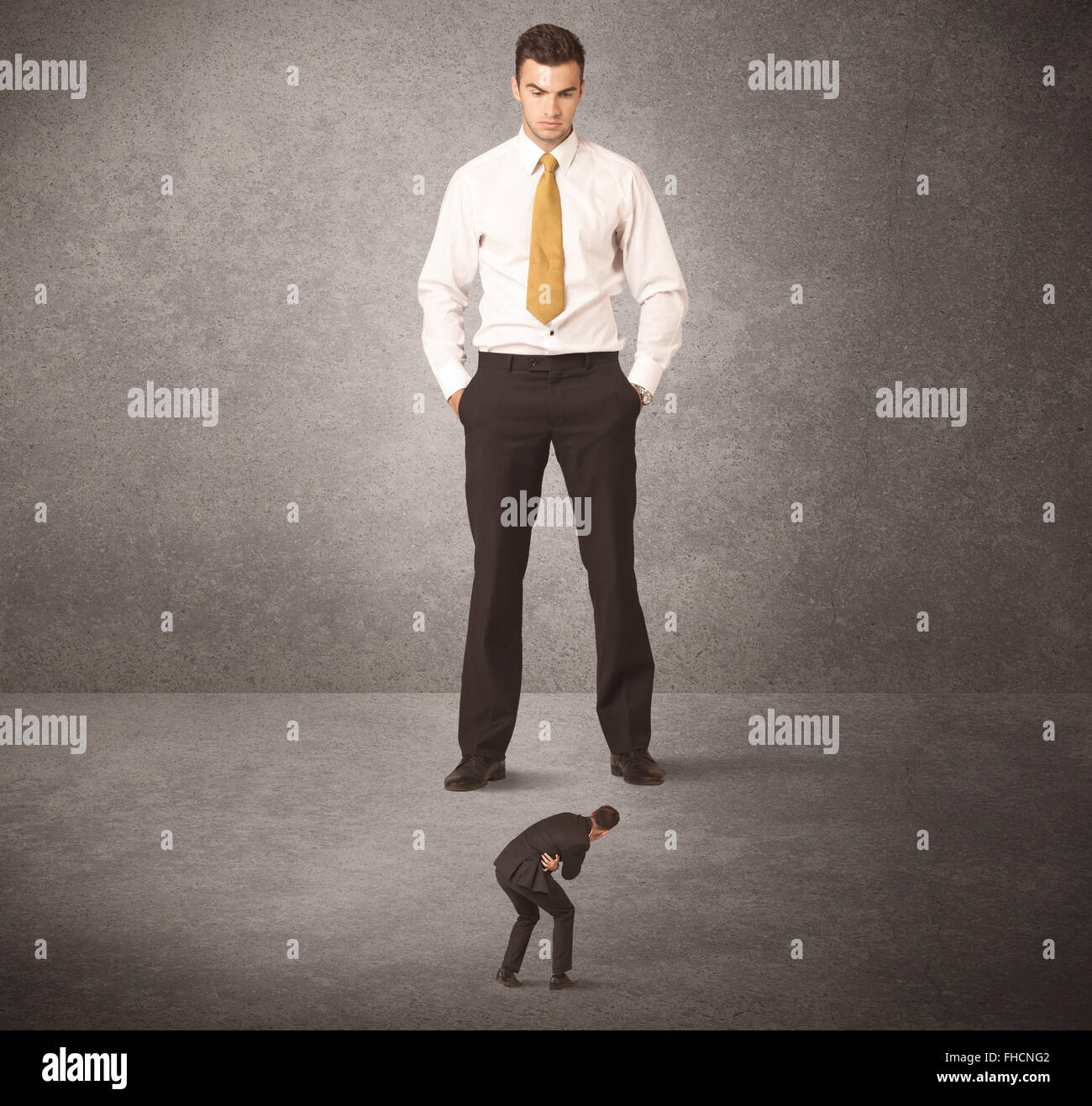 Giant Man Looking At Small Man High Resolution Stock Photography and ...
