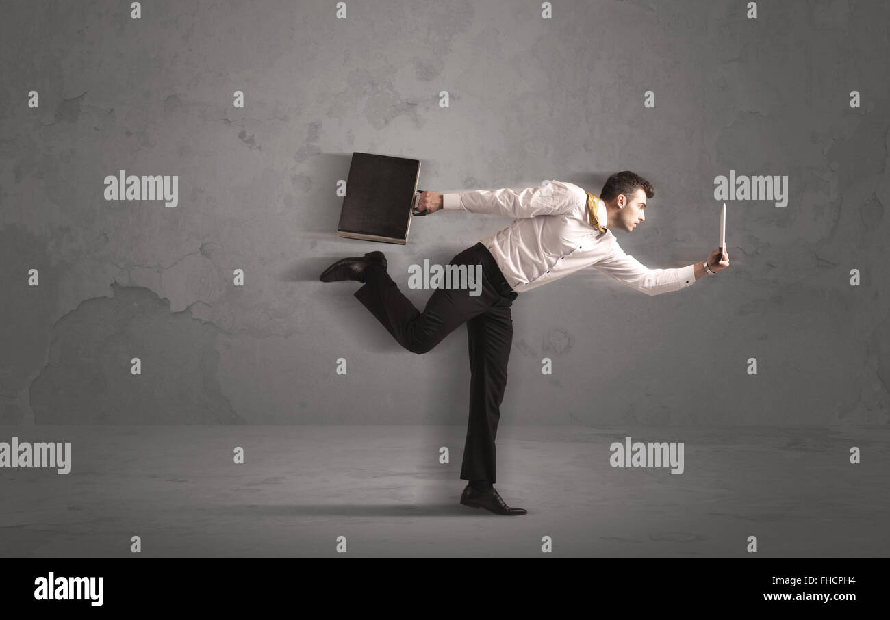 Running businessman device hand hi-res stock photography and images - Alamy