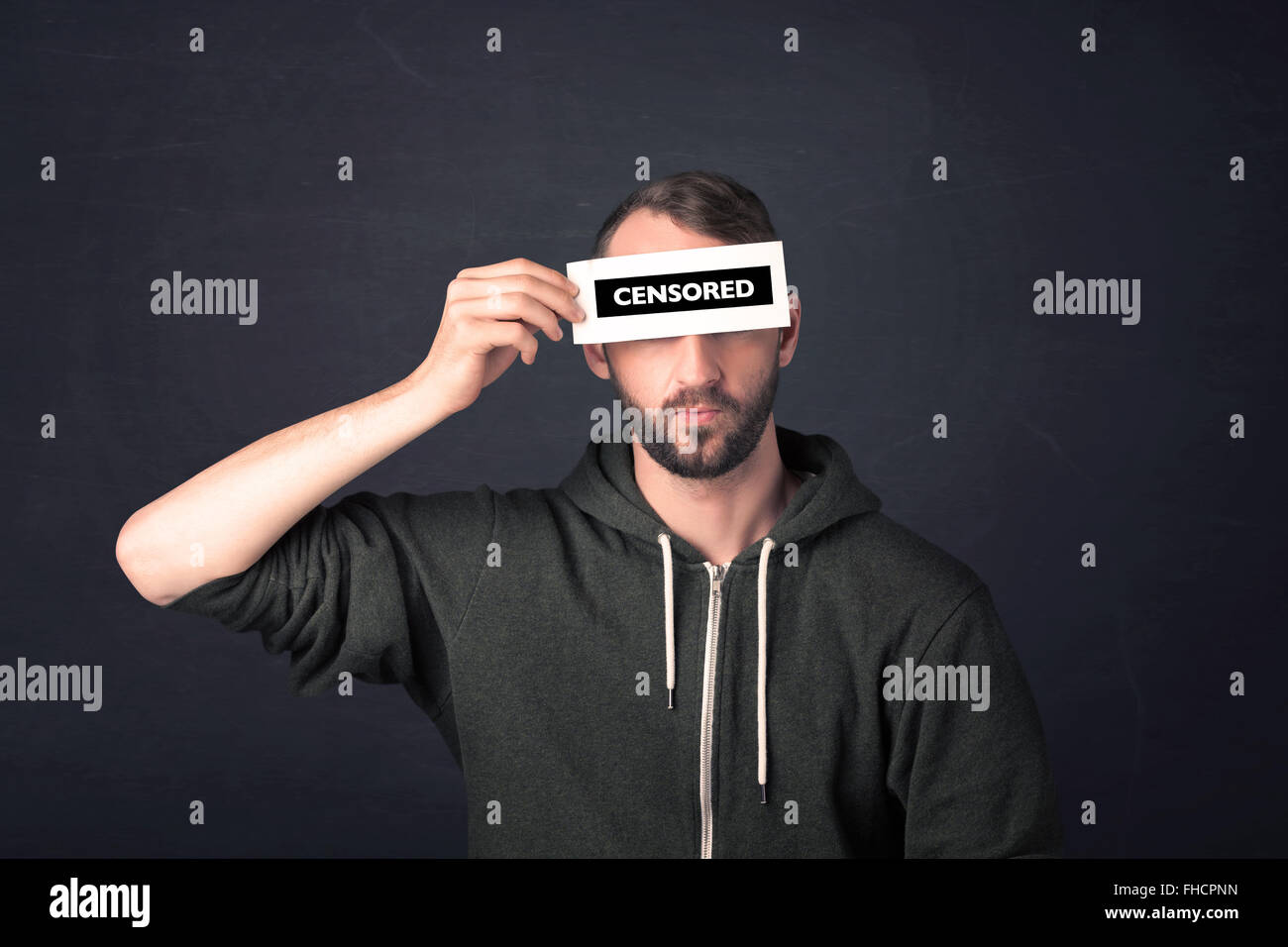 Funny guy with censored sign paper Stock Photo - Alamy