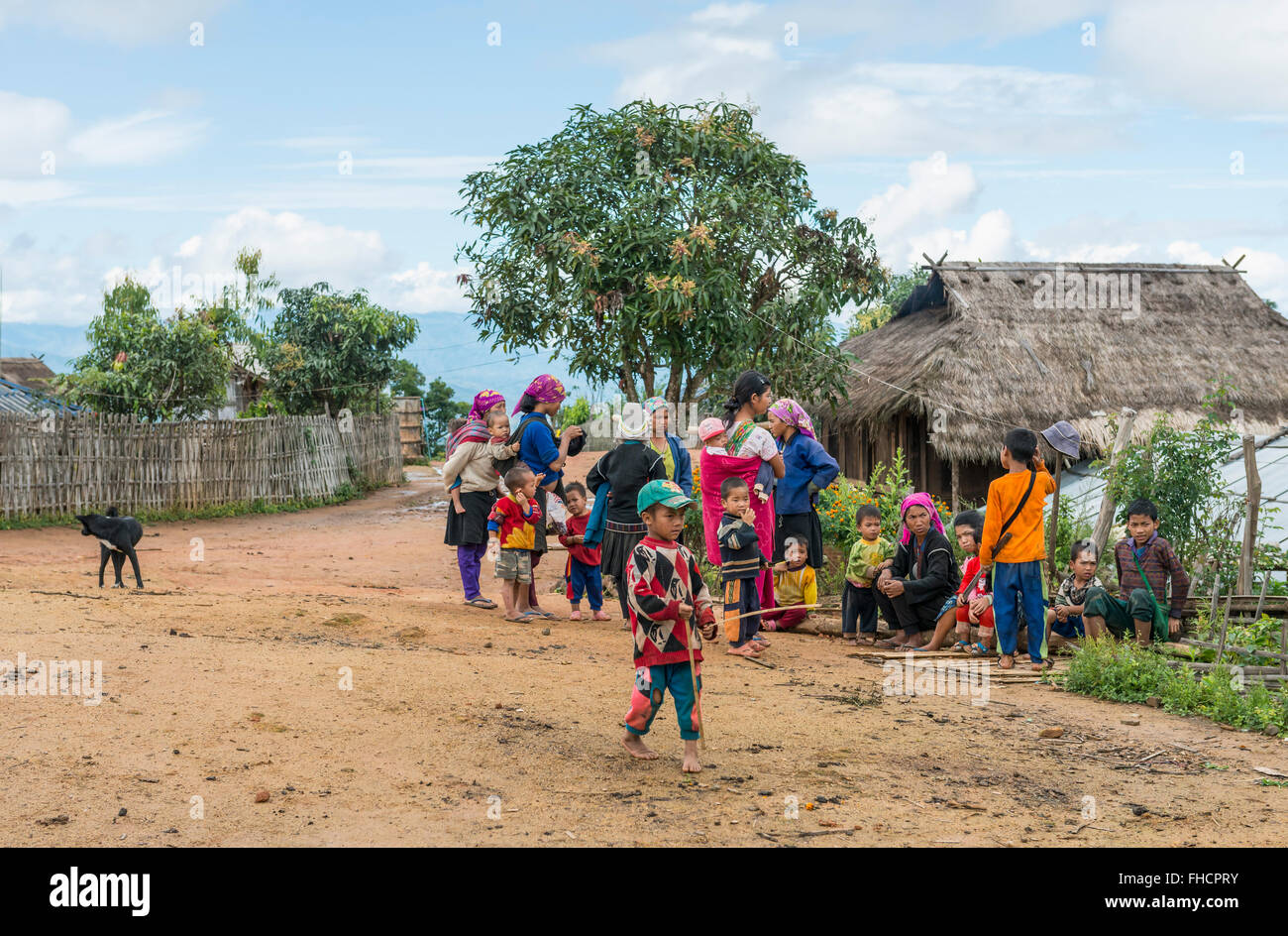 Akha people gathering in village centre. Chen tung, Burma Stock Photo ...