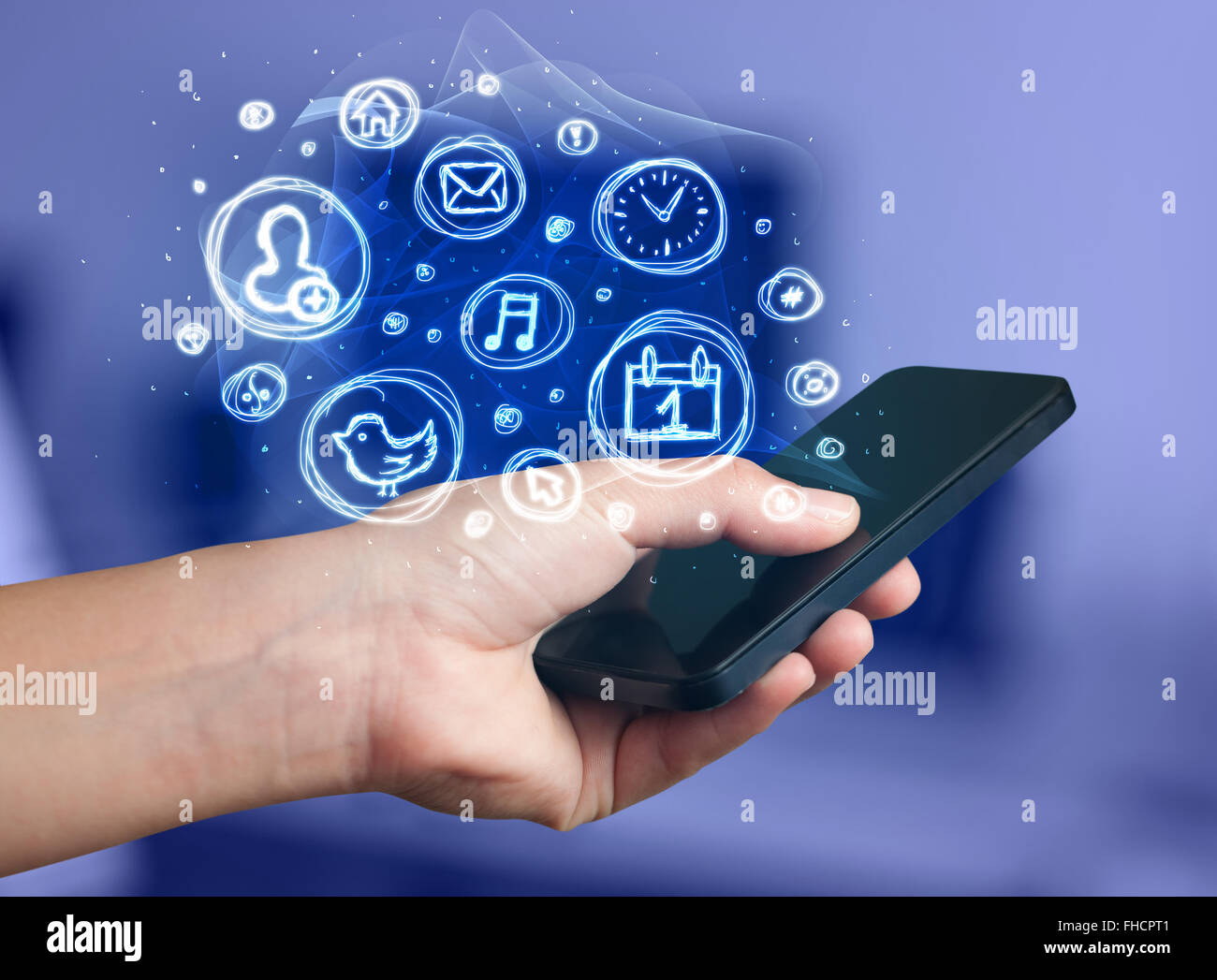 Hand holding smartphone with mobile app choices Stock Photo - Alamy
