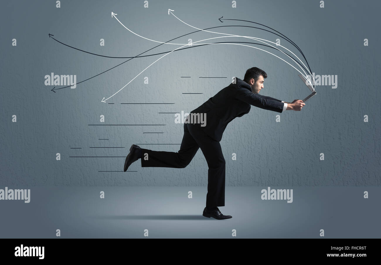 Running businessman with device and hand drawn lines Stock Photo - Alamy