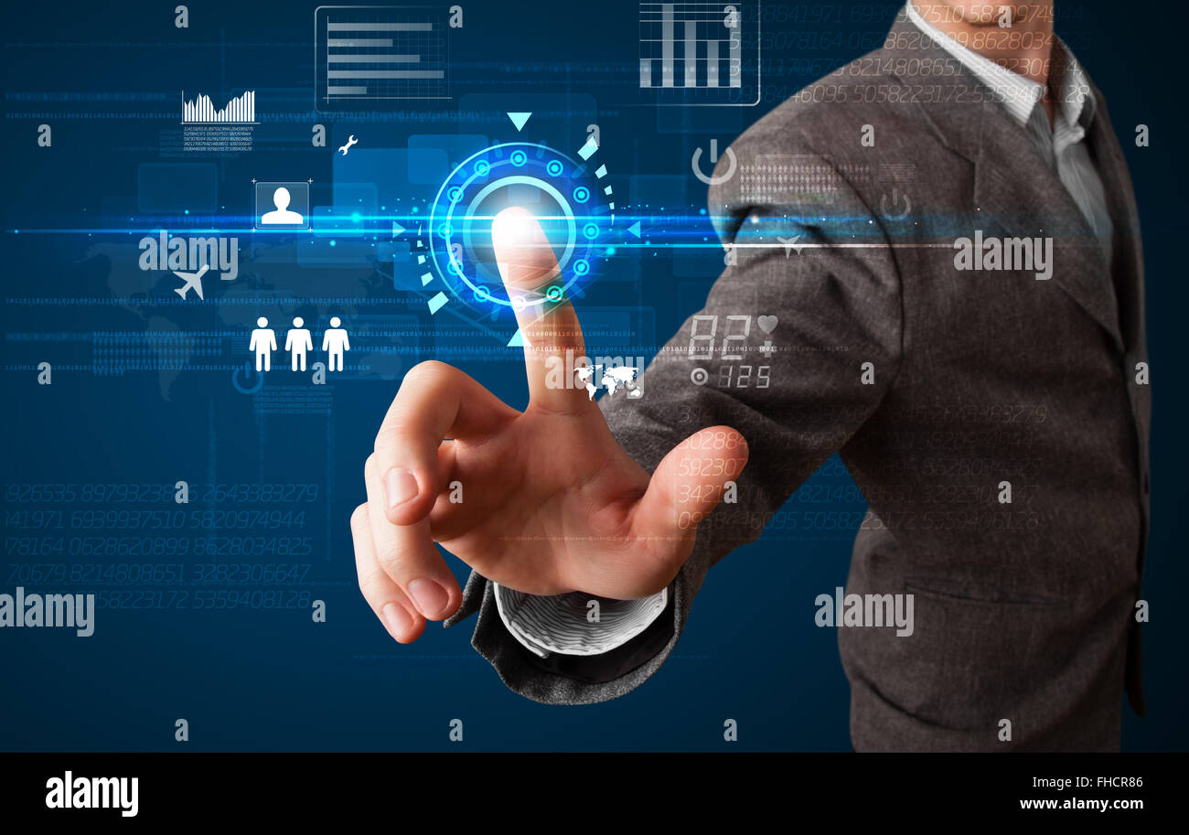 Handsome businessman touching future web technology buttons and icons ...