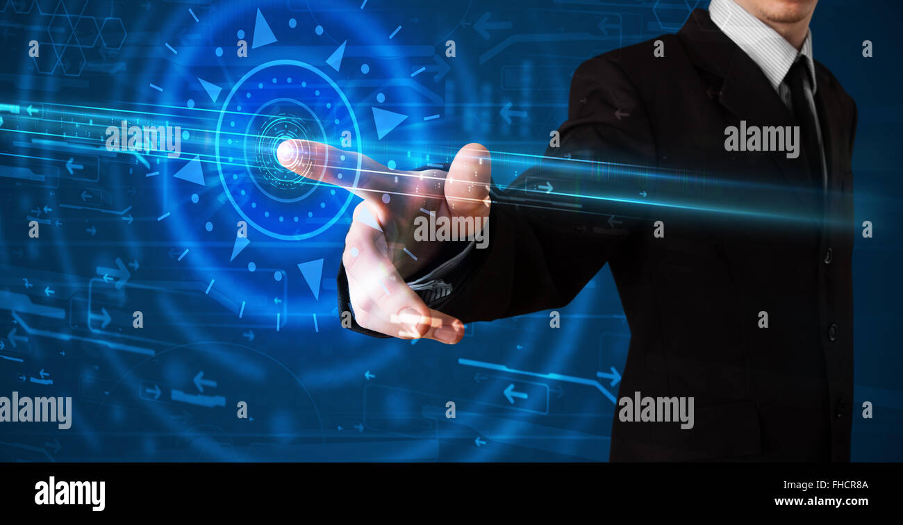 Handsome tech guy pressing high technology control panel screen concept ...