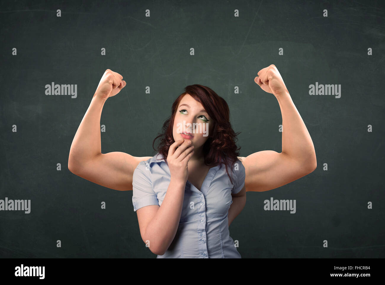 Young woman strong muscled arms hi-res stock photography and images - Alamy