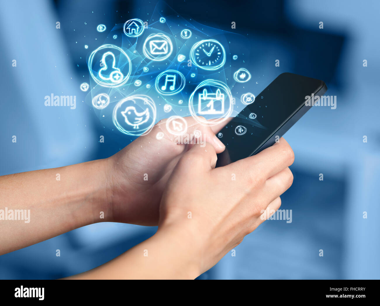 Hand holding smartphone with mobile app choices Stock Photo - Alamy