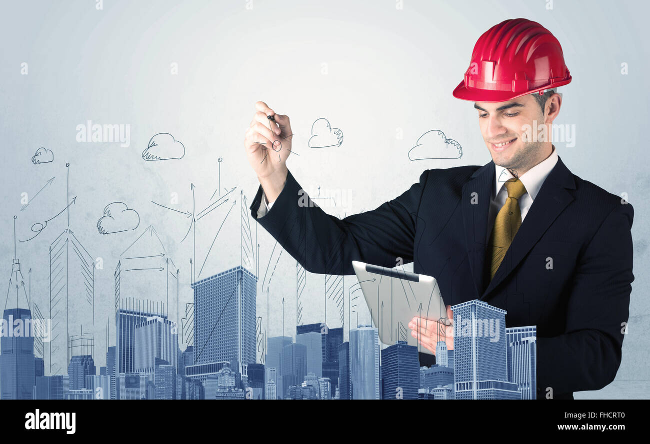 Young worker drawing a city sight Stock Photo - Alamy