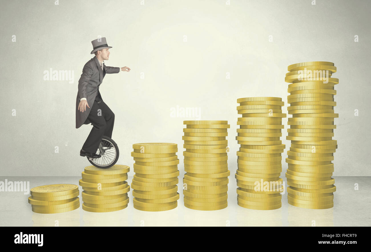 Business man riding monocycle up on coin graph Stock Photo - Alamy