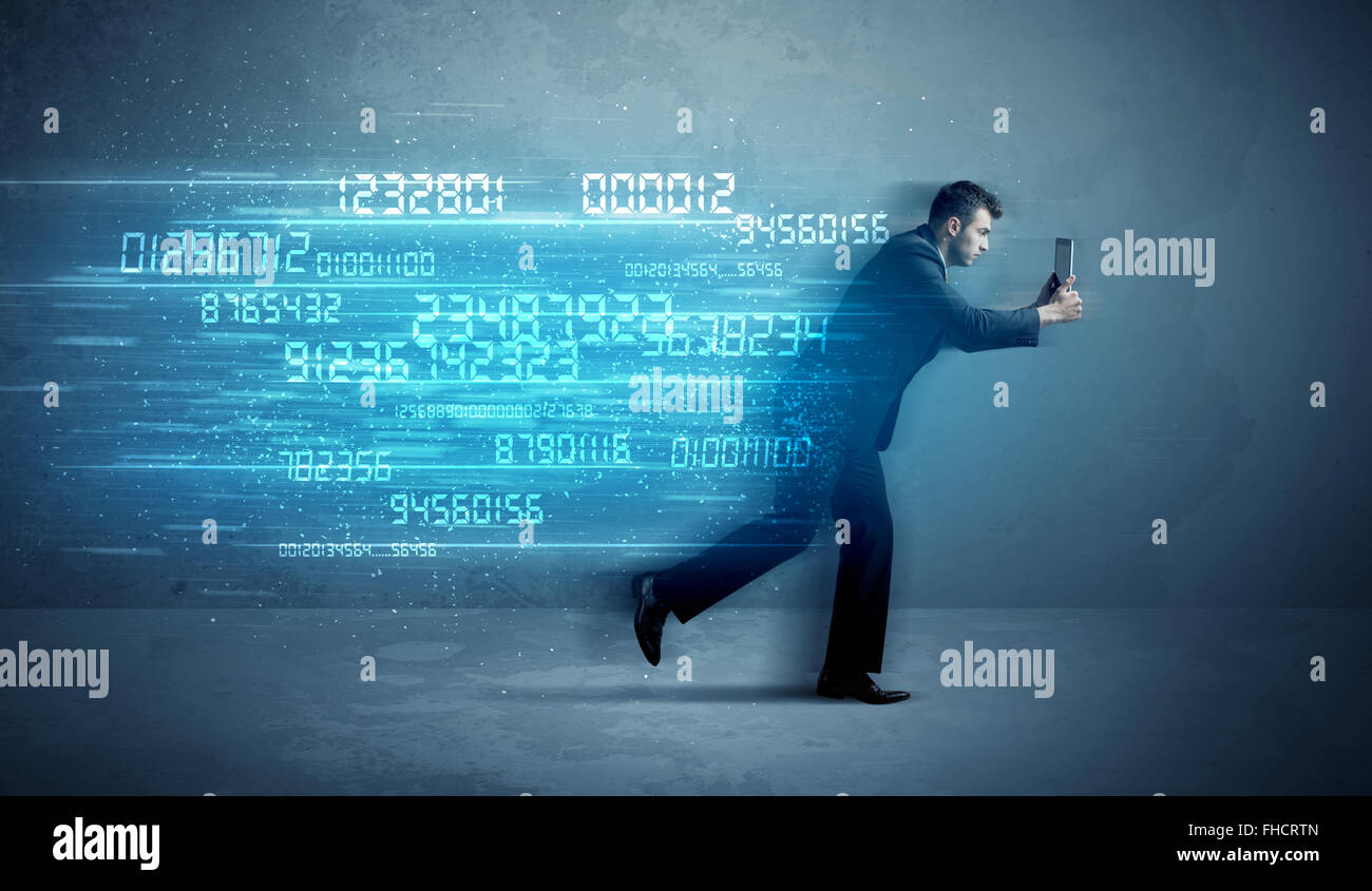 Business man running with device and data concept Stock Photo - Alamy