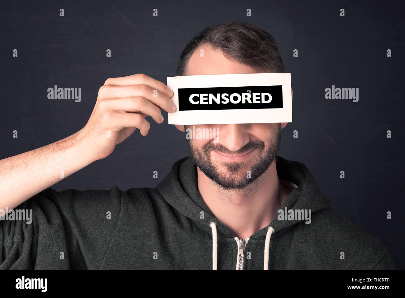 Funny guy with censored sign paper Stock Photo - Alamy