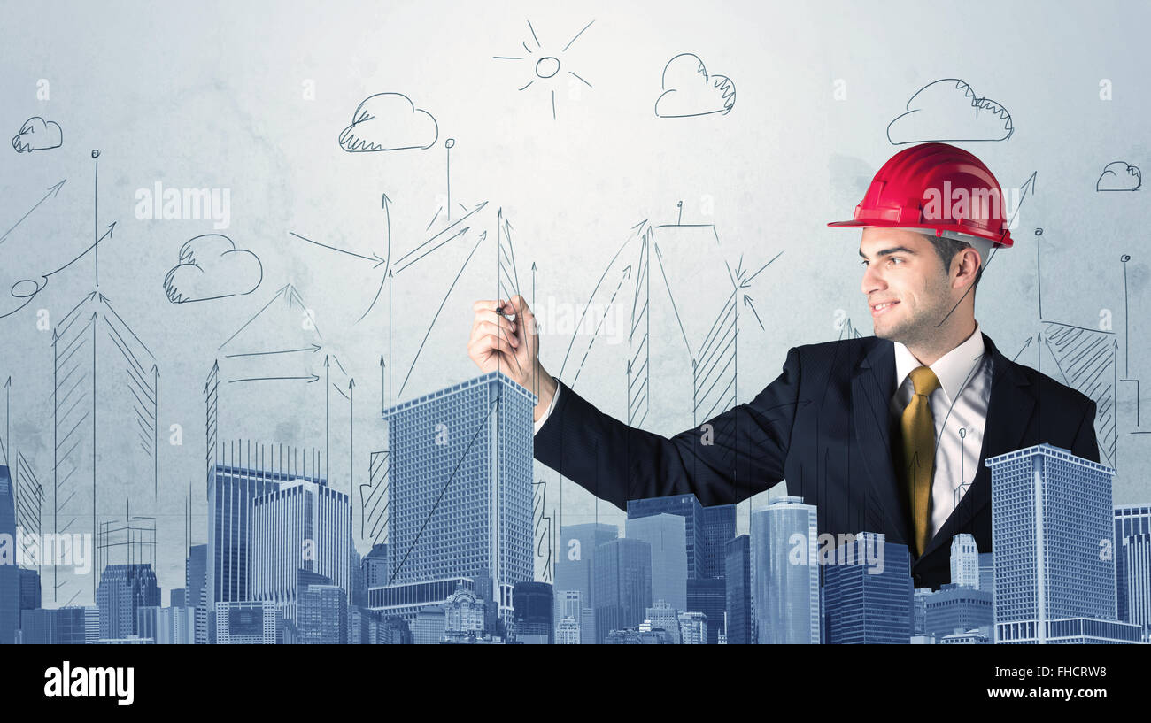 Young worker drawing a city sight Stock Photo - Alamy