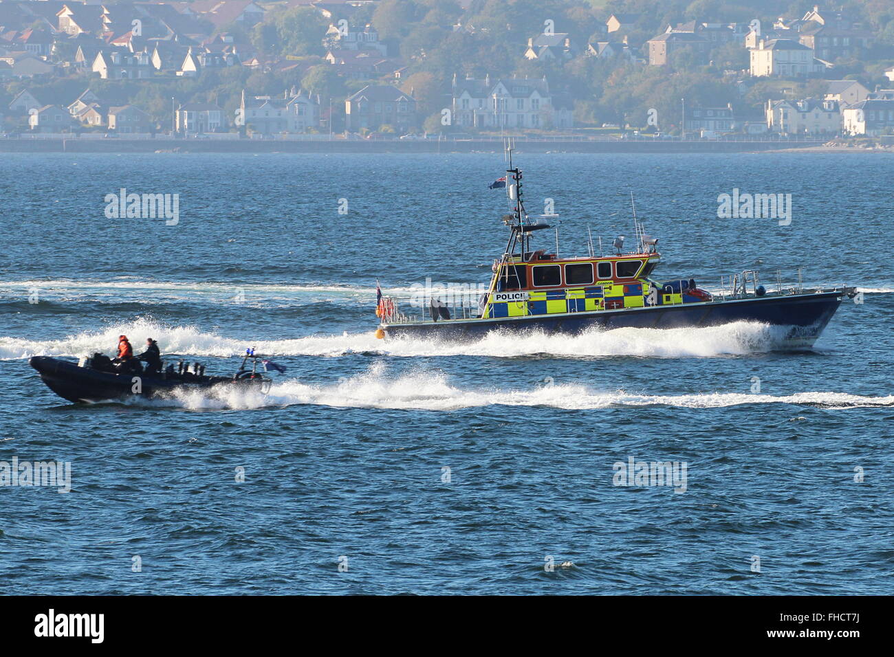 A MoD Police RIB, and the launch Condor, carrying out escort and ...