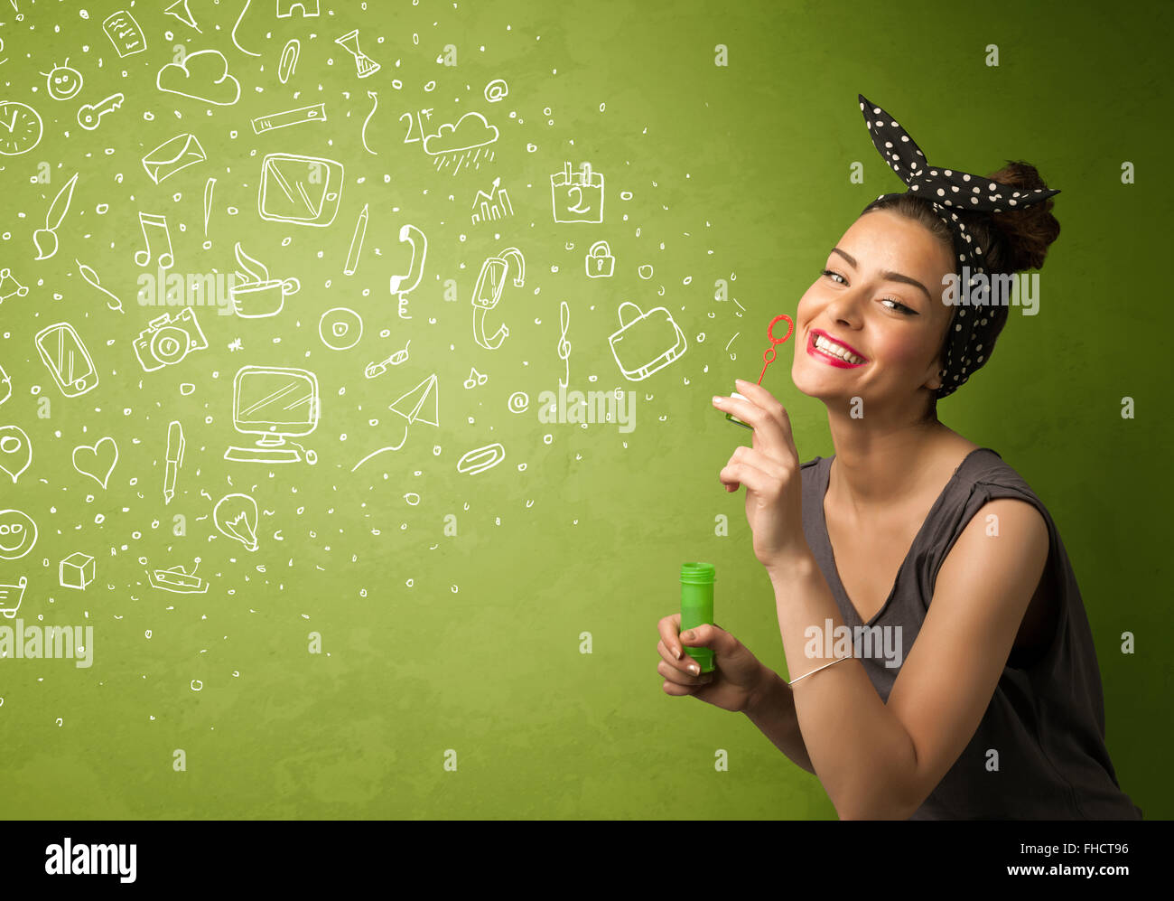 Cute girl blowing hand drawn media icons and symbols Stock Photo - Alamy