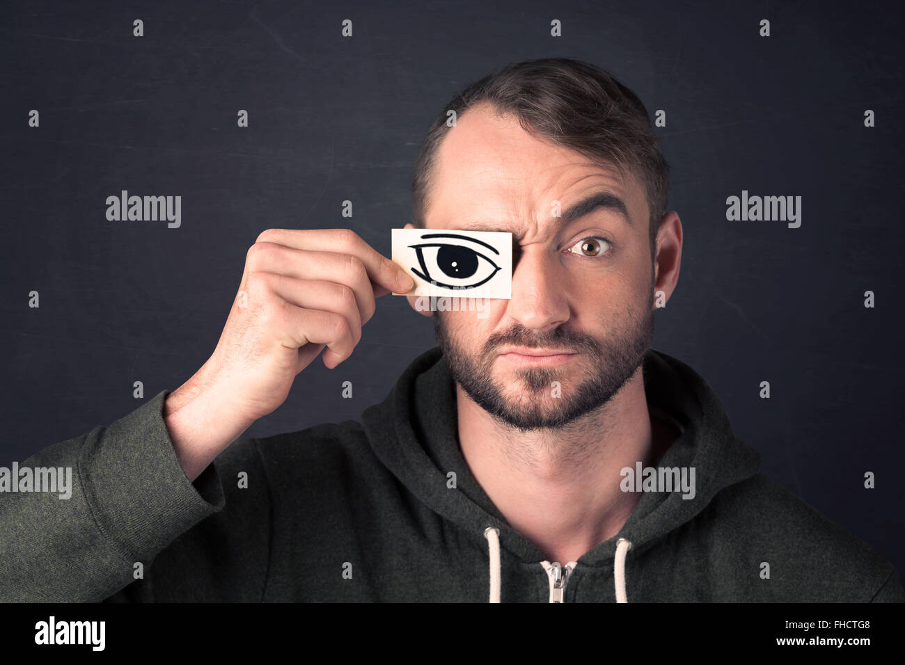 Funny guy with censored sign paper Stock Photo - Alamy