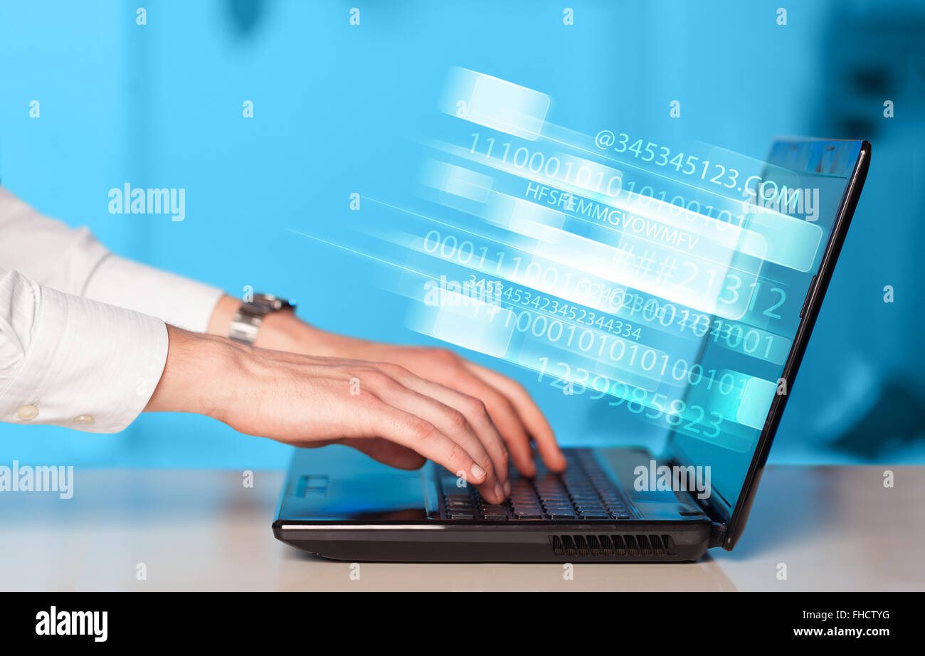 Close up of man typing on laptop computer Stock Photo - Alamy