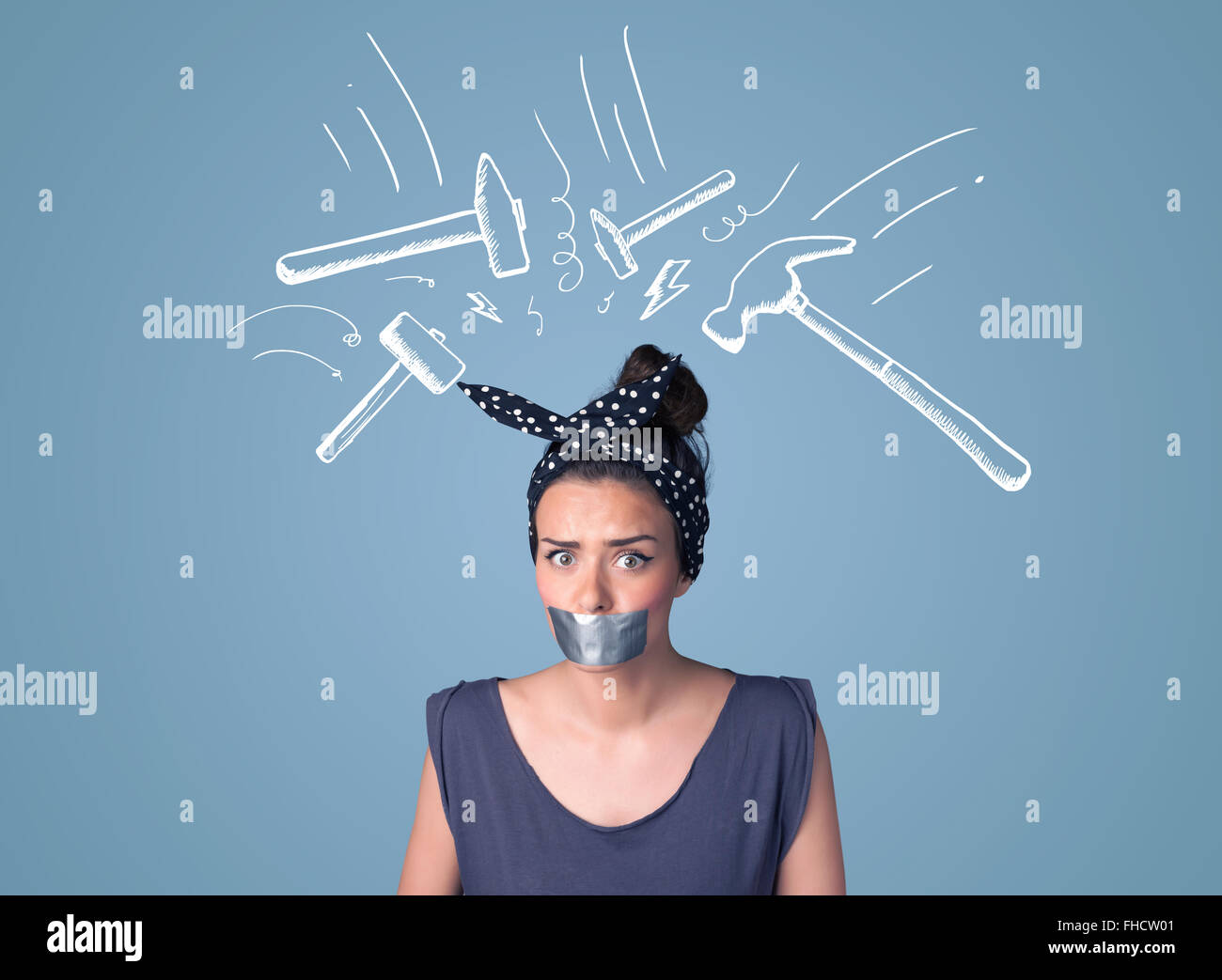 Young woman with glued mouth and hammer marks Stock Photo - Alamy