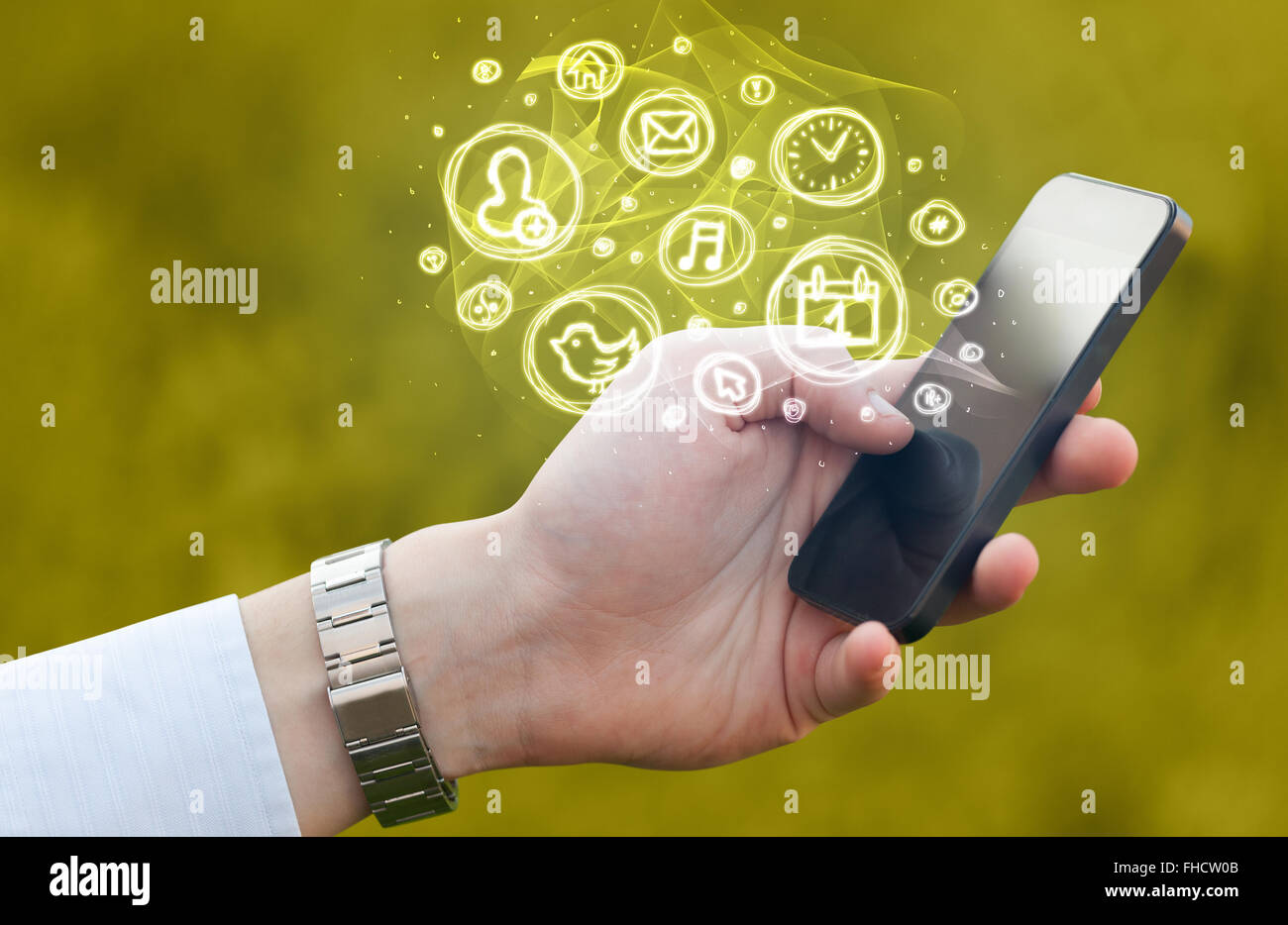 Hand holding smartphone with mobile app choices Stock Photo - Alamy