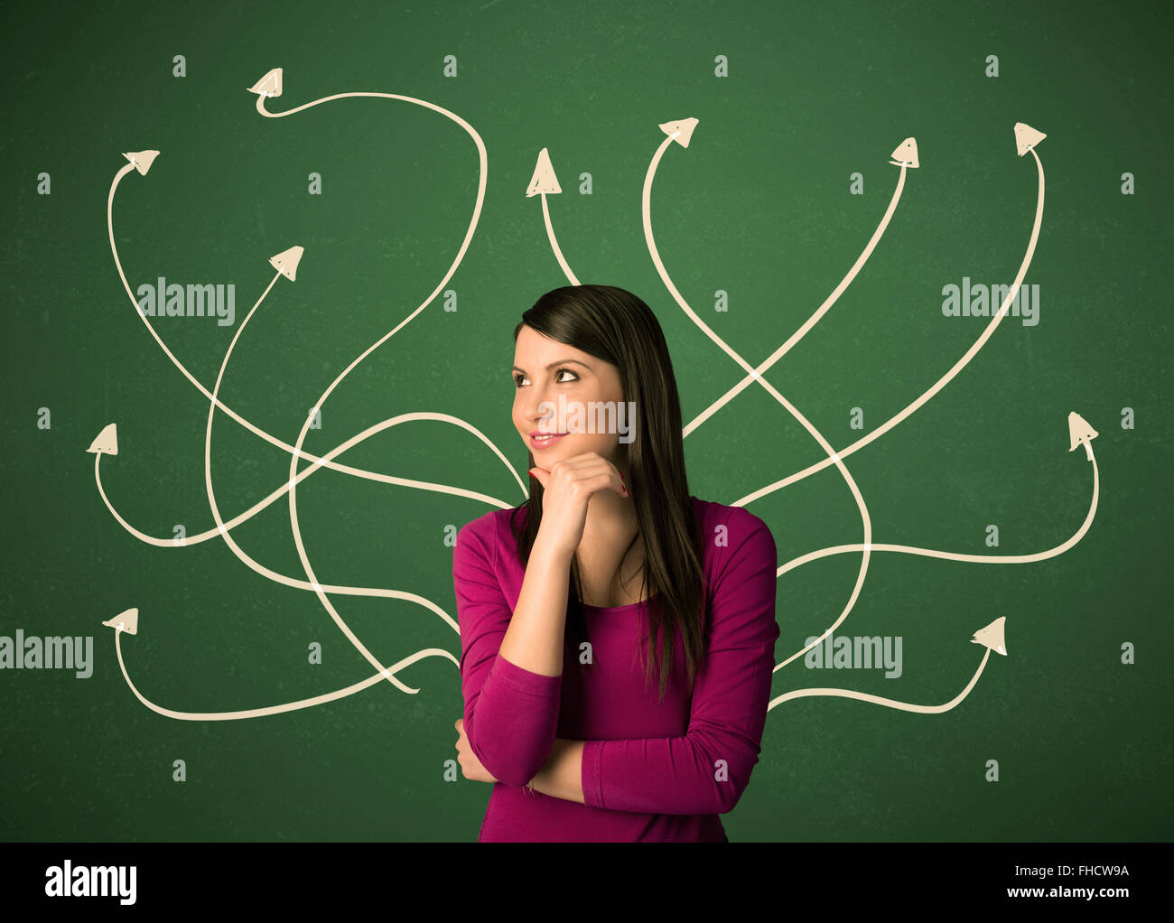 Beautiful girl thinking a solution Stock Photo - Alamy