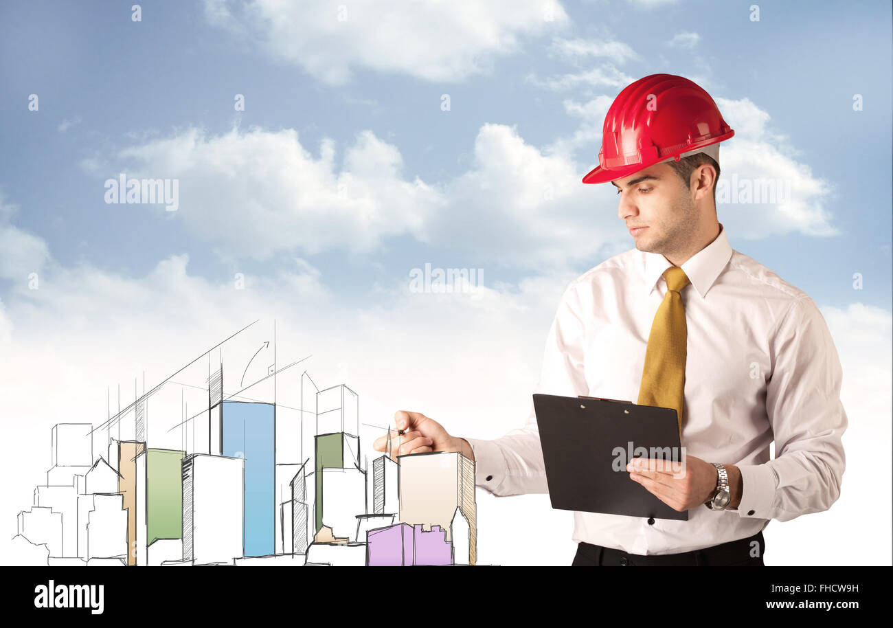 Construction worker planning a city sight Stock Photo - Alamy