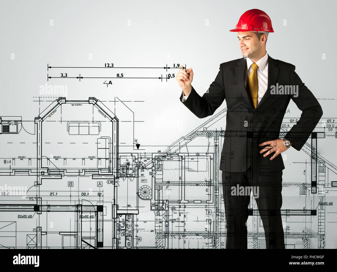An young architect drawing a house plan Stock Photo - Alamy