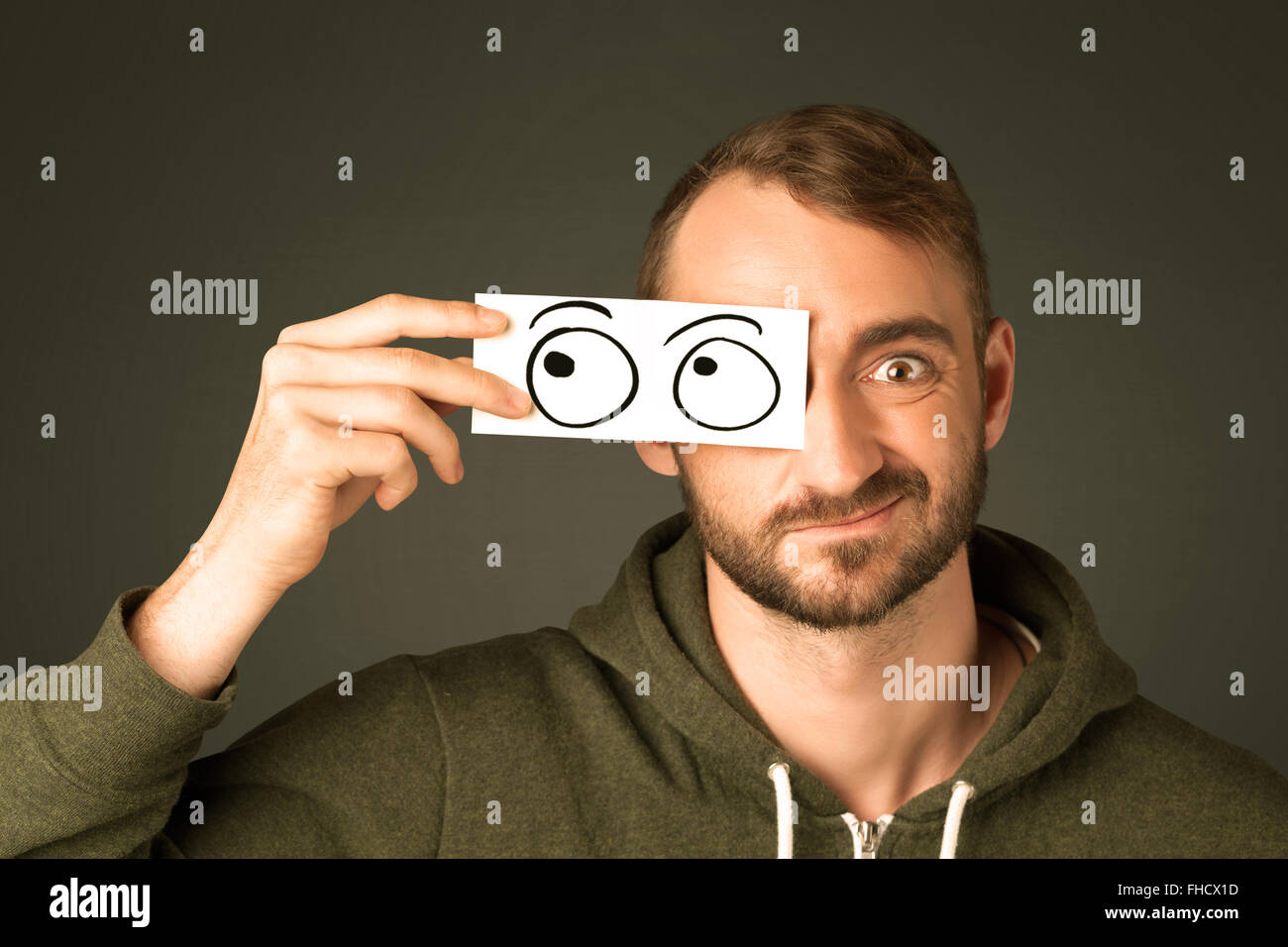 Silly man looking with hand drawn eye balls Stock Photo - Alamy