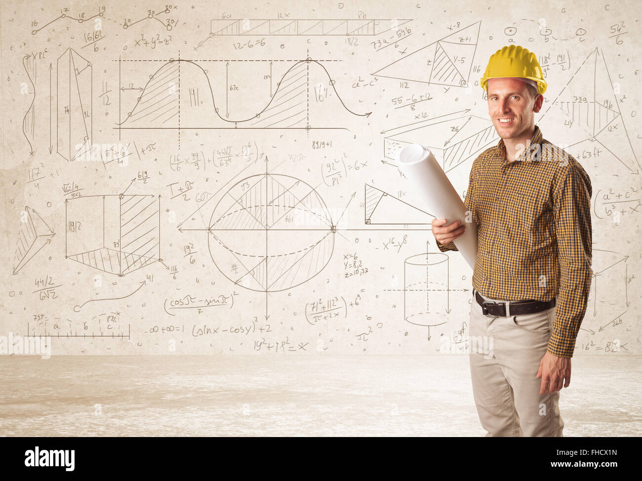 Handsome engineer calculating with hand drawn background Stock Photo ...