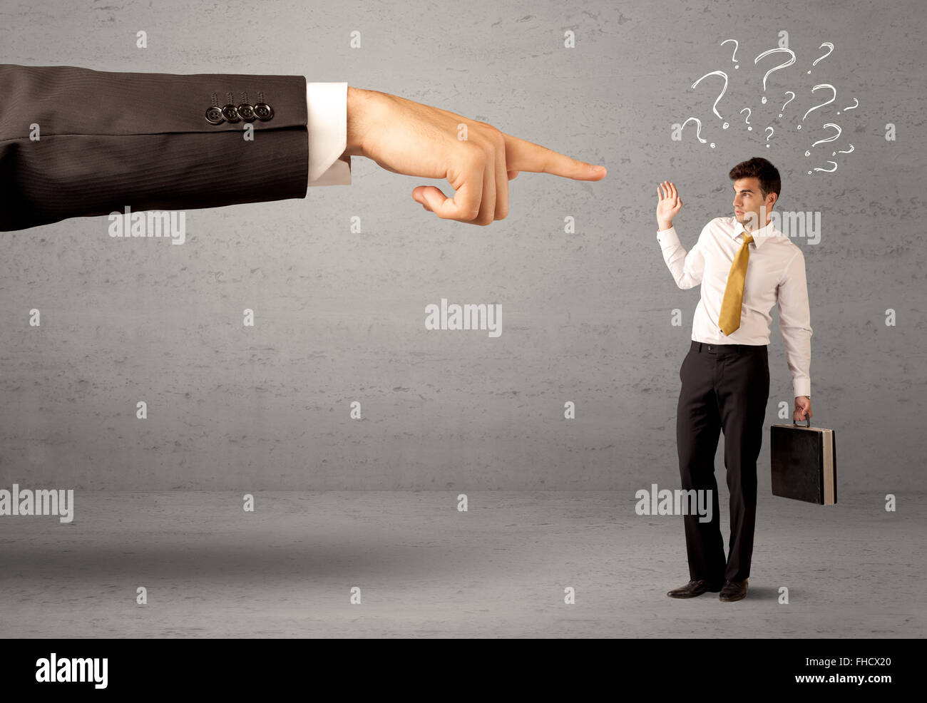 Confused employee getting order from boss Stock Photo - Alamy