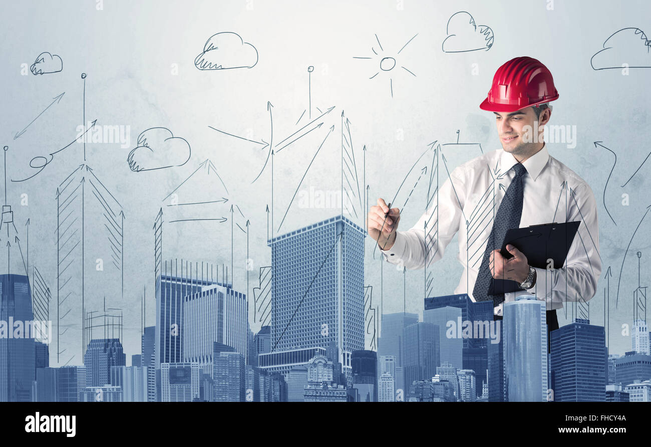 Young worker drawing a city sight Stock Photo - Alamy