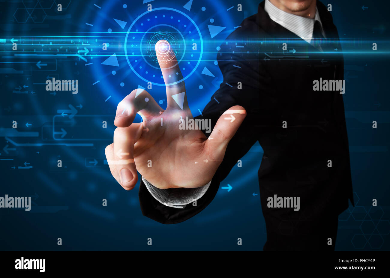 Handsome tech guy pressing high technology control panel screen concept ...