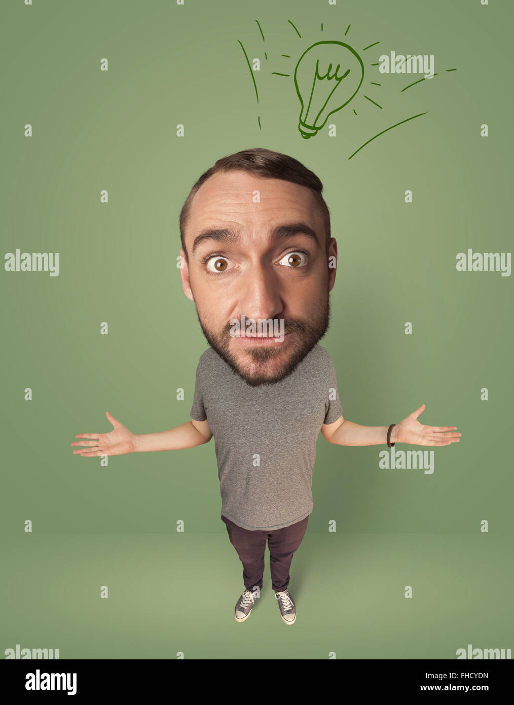 Big head person with idea bulb Stock Photo - Alamy
