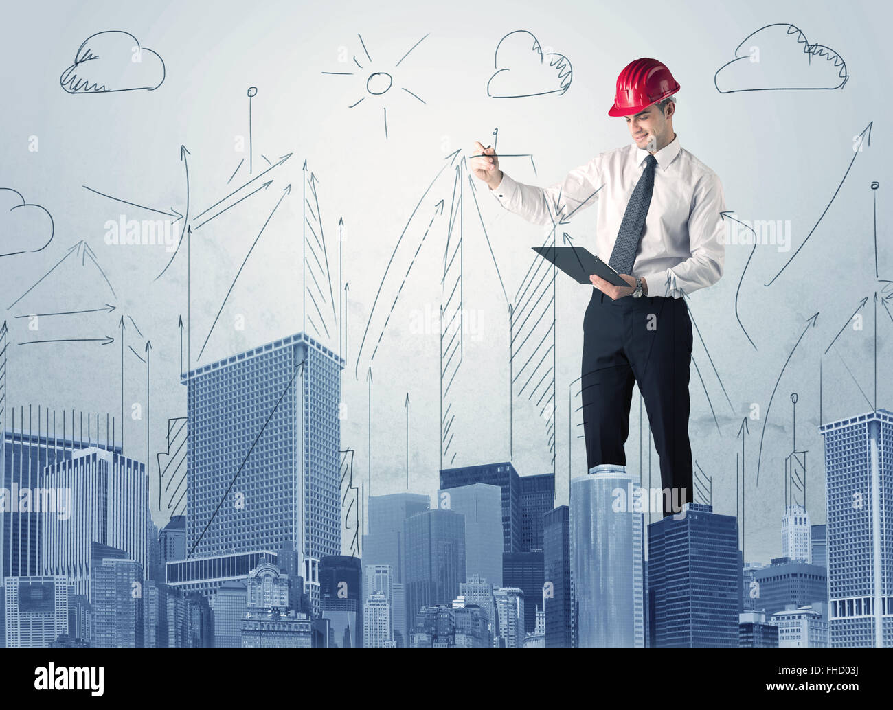 Young worker drawing a city sight Stock Photo - Alamy