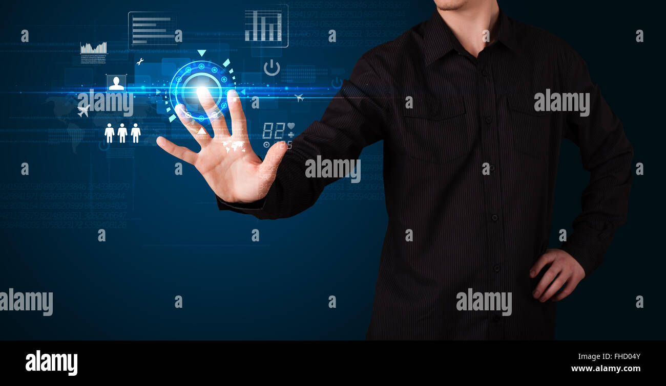Handsome businessman touching future web technology buttons and icons ...