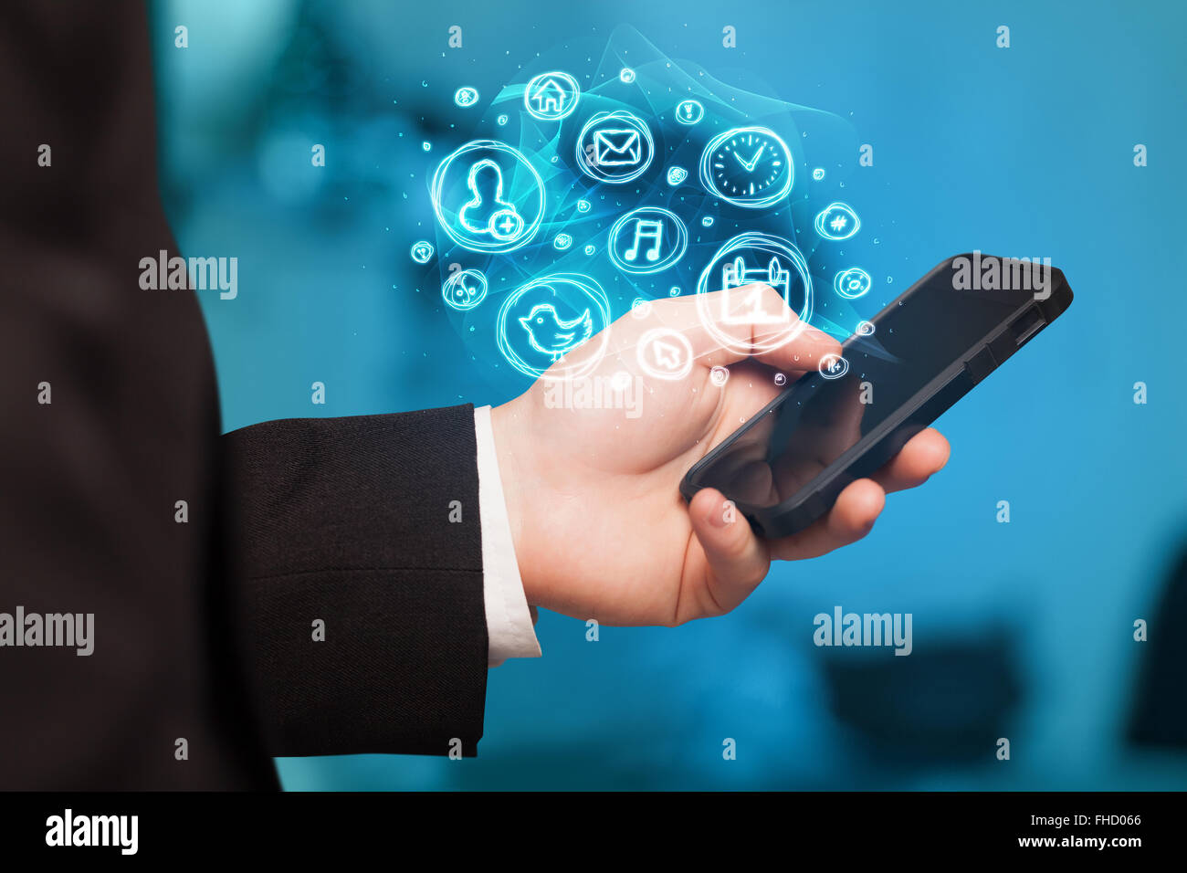 Hand holding smartphone with mobile app choices Stock Photo - Alamy
