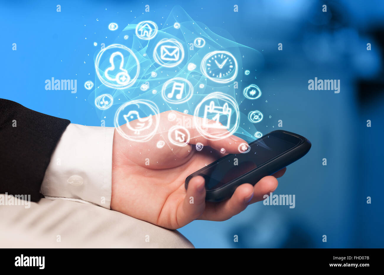 Hand holding smartphone with mobile app choices Stock Photo - Alamy
