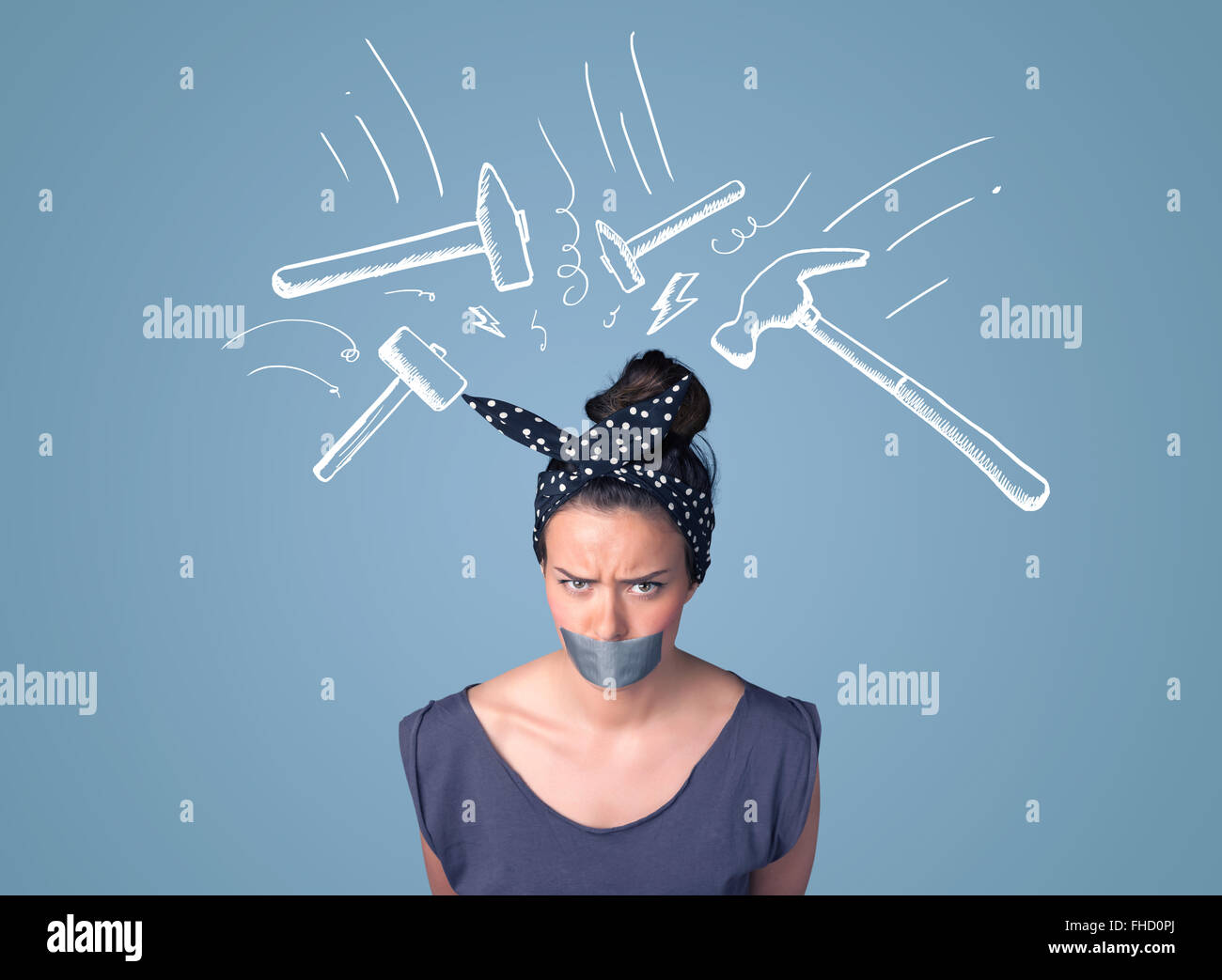 Young woman with glued mouth and hammer marks Stock Photo - Alamy