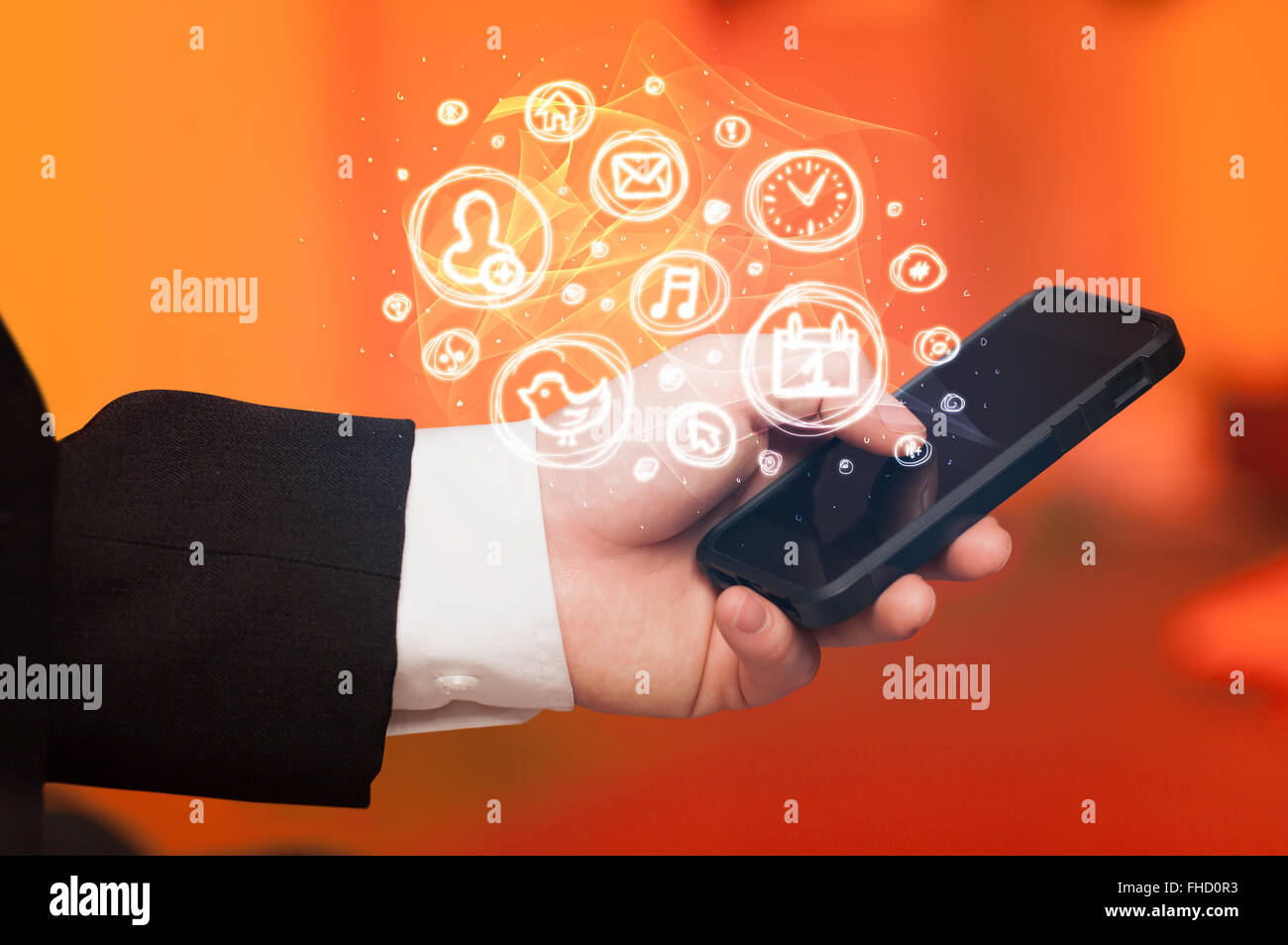 Hand holding smartphone with mobile app choices Stock Photo - Alamy