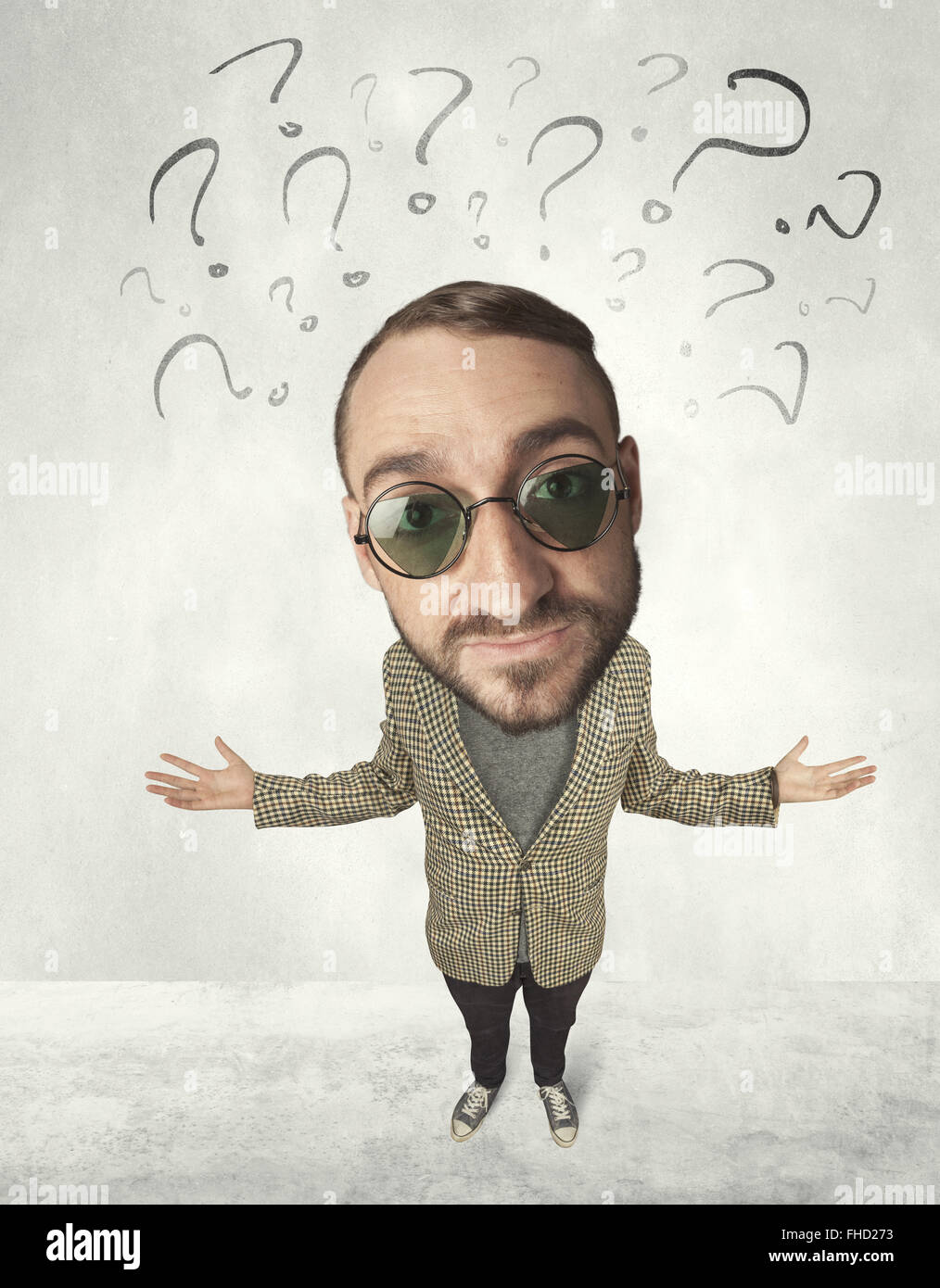 Big head person with question marks Stock Photo - Alamy