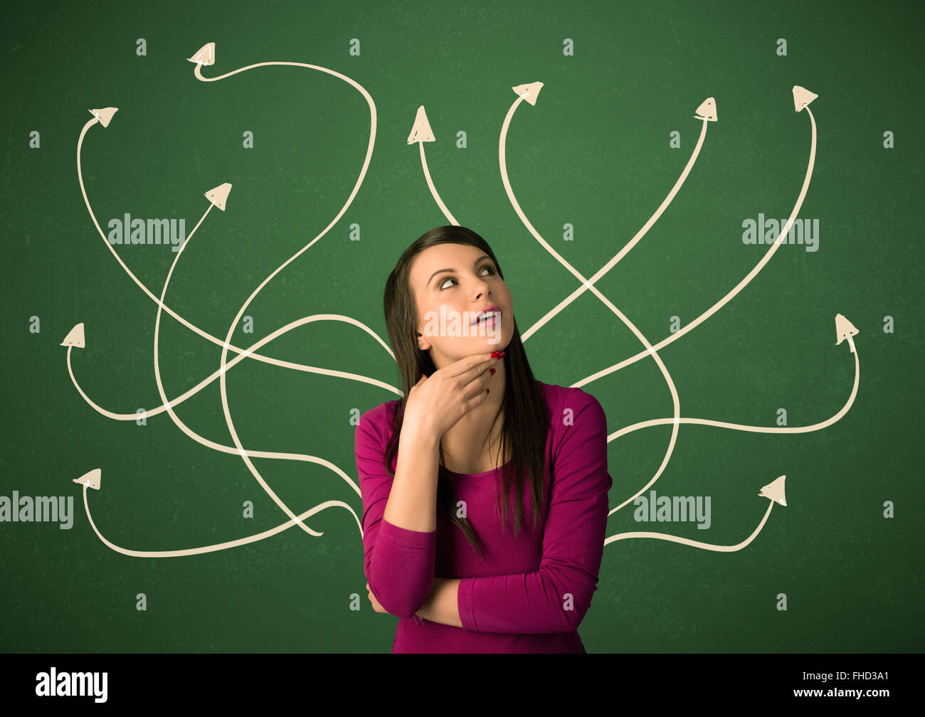 Beautiful girl thinking a solution Stock Photo - Alamy